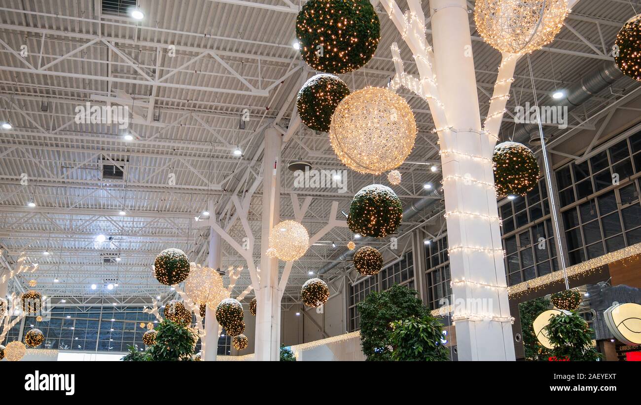 Lighting poles in form of a huge Christmas ball Stock Photo - Alamy