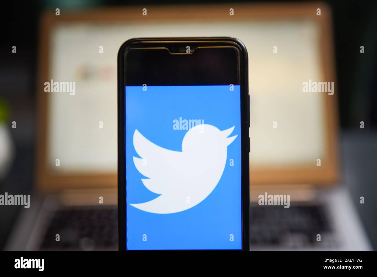 In this photo illustration a Twitter logo seen displayed on a ...