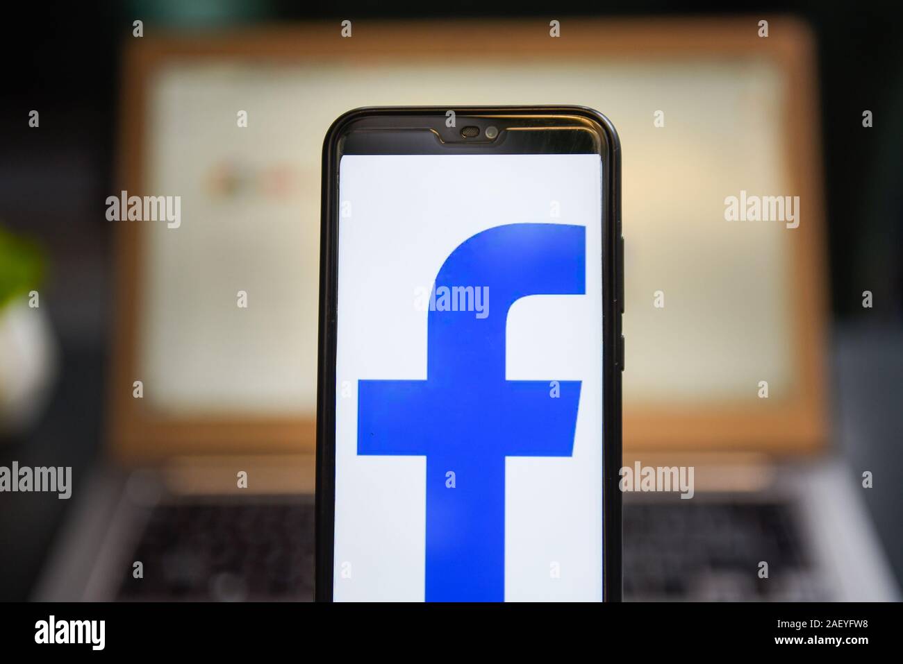 In this photo illustration a Facebook logo seen displayed on a ...