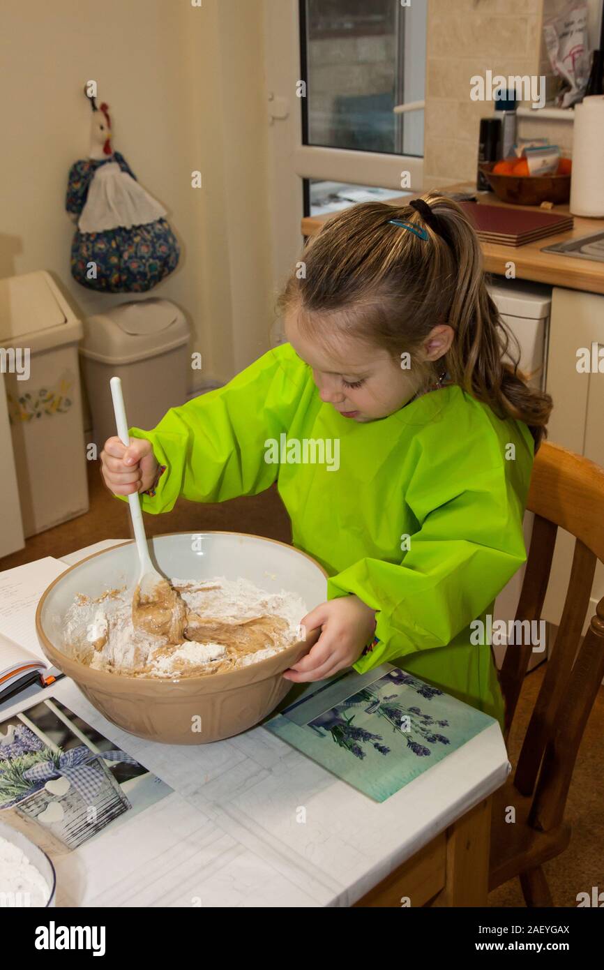 Child making a cake Stock Photo - Alamy
