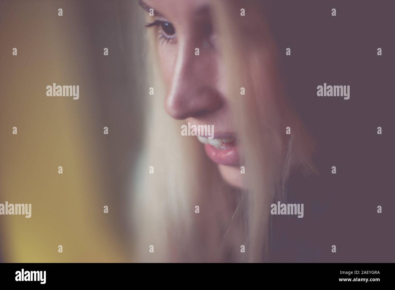 Happy talking with a smile young blond woman portrait, side view, art ...