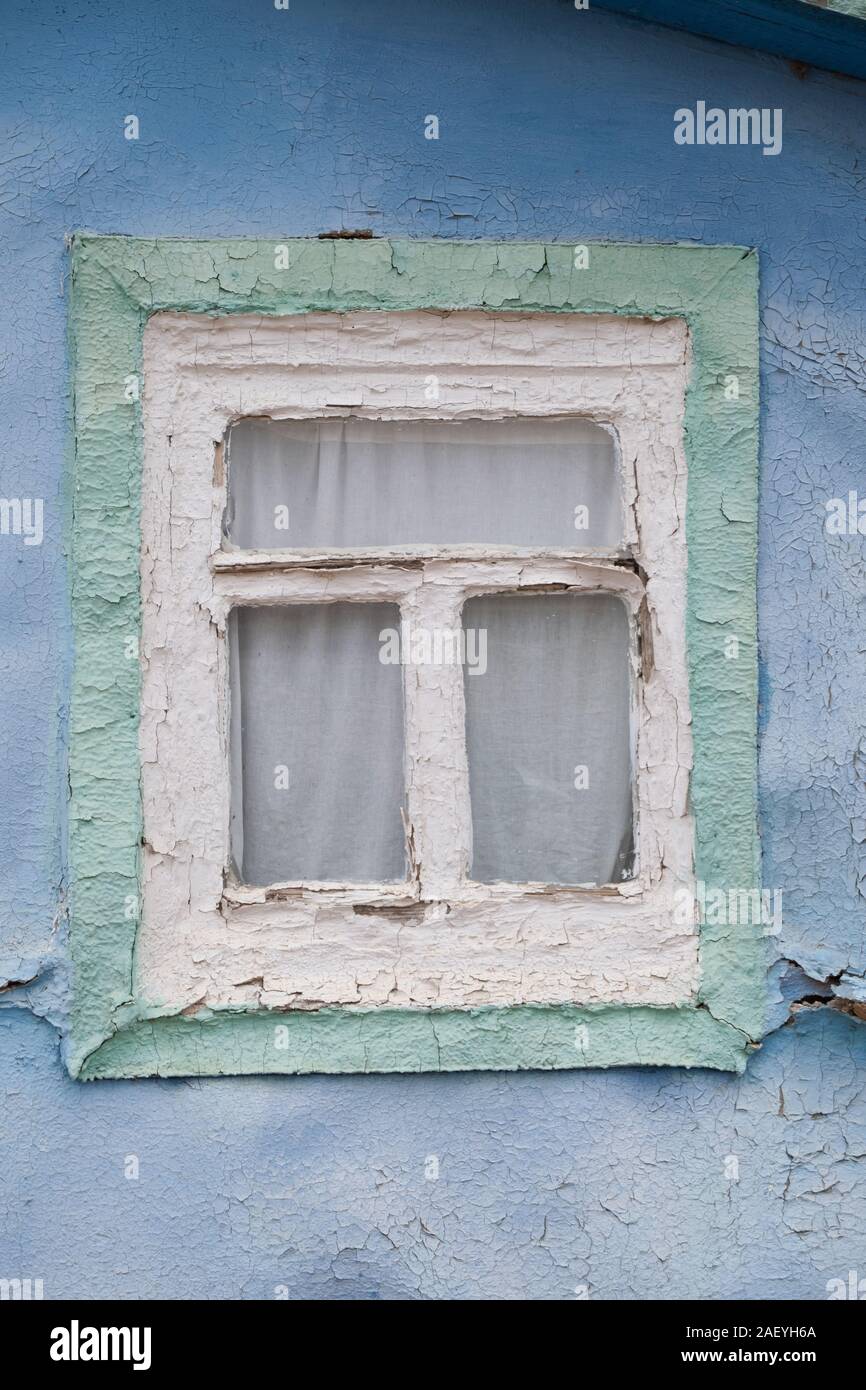 Vintage rustic wooden window frame. Old peeling paint cottage house ...
