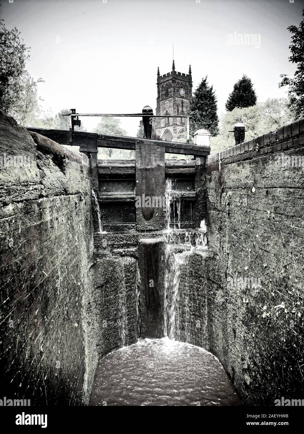 Interior of a narrow Lock with St Mary's Church at Kidderminster, UK ...