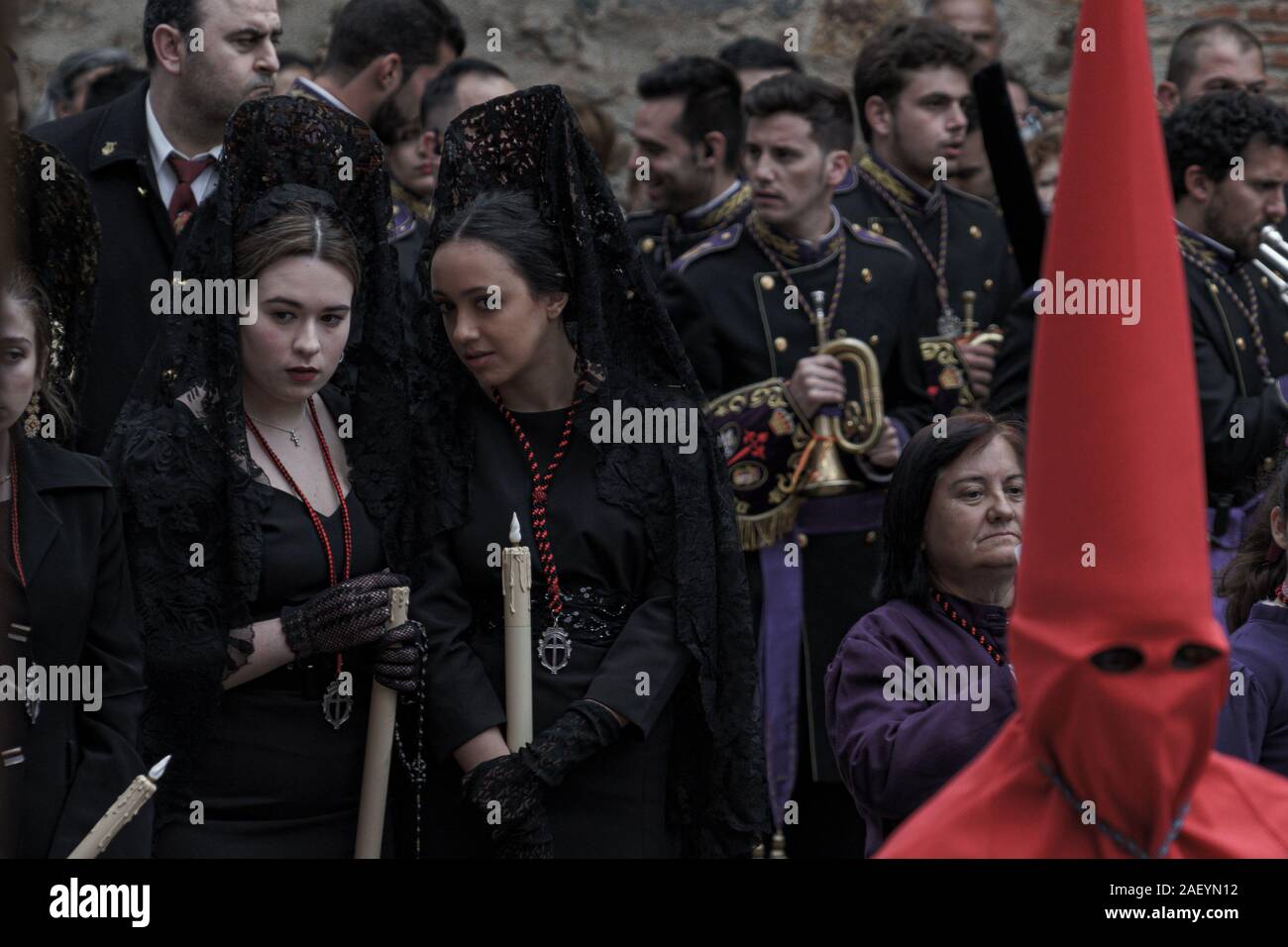 Girls in Easter procession with a black lace mantilla, a traditional ...