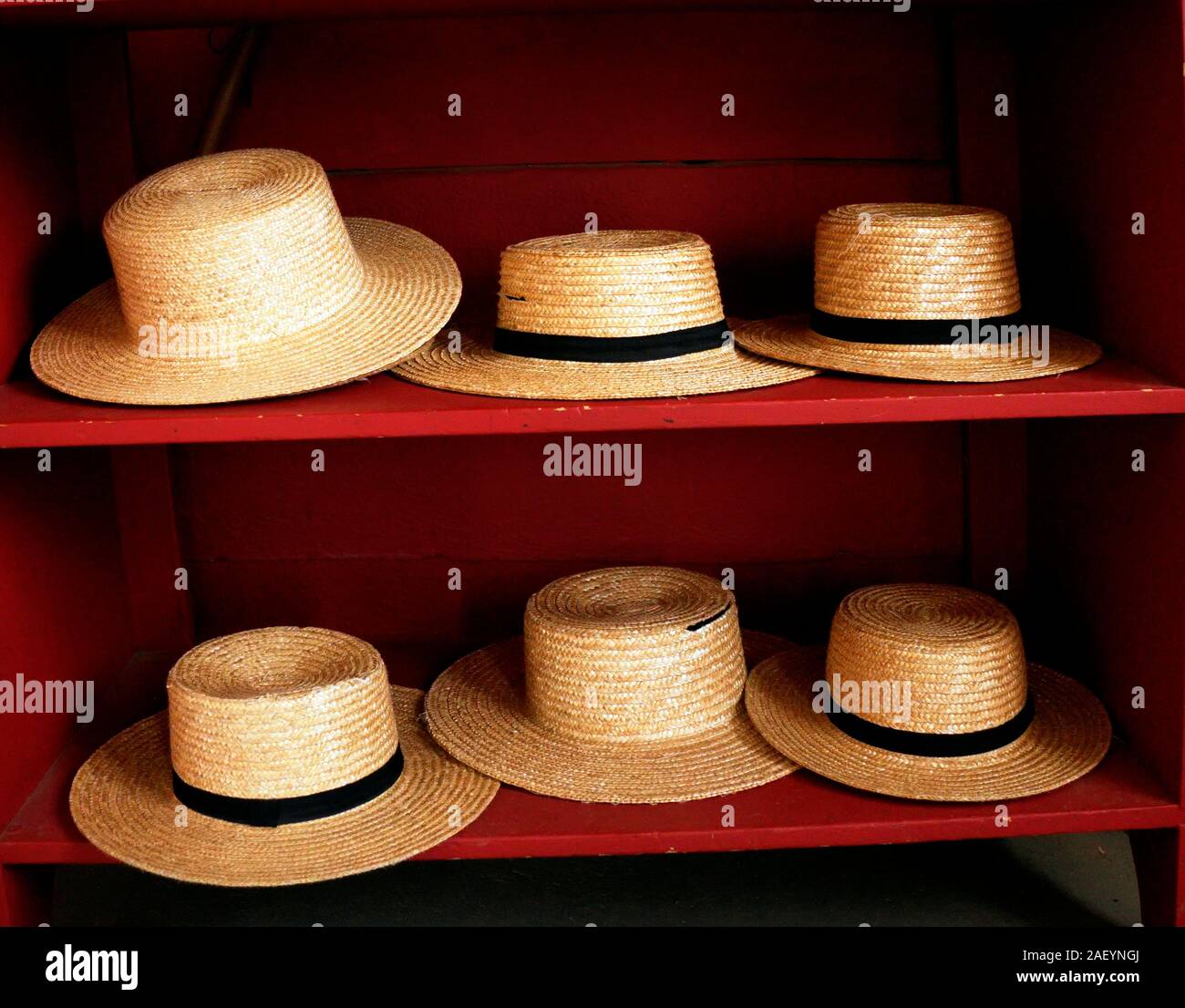 Collection of traditional Amish straw hats. Handmade rustic headwear ...