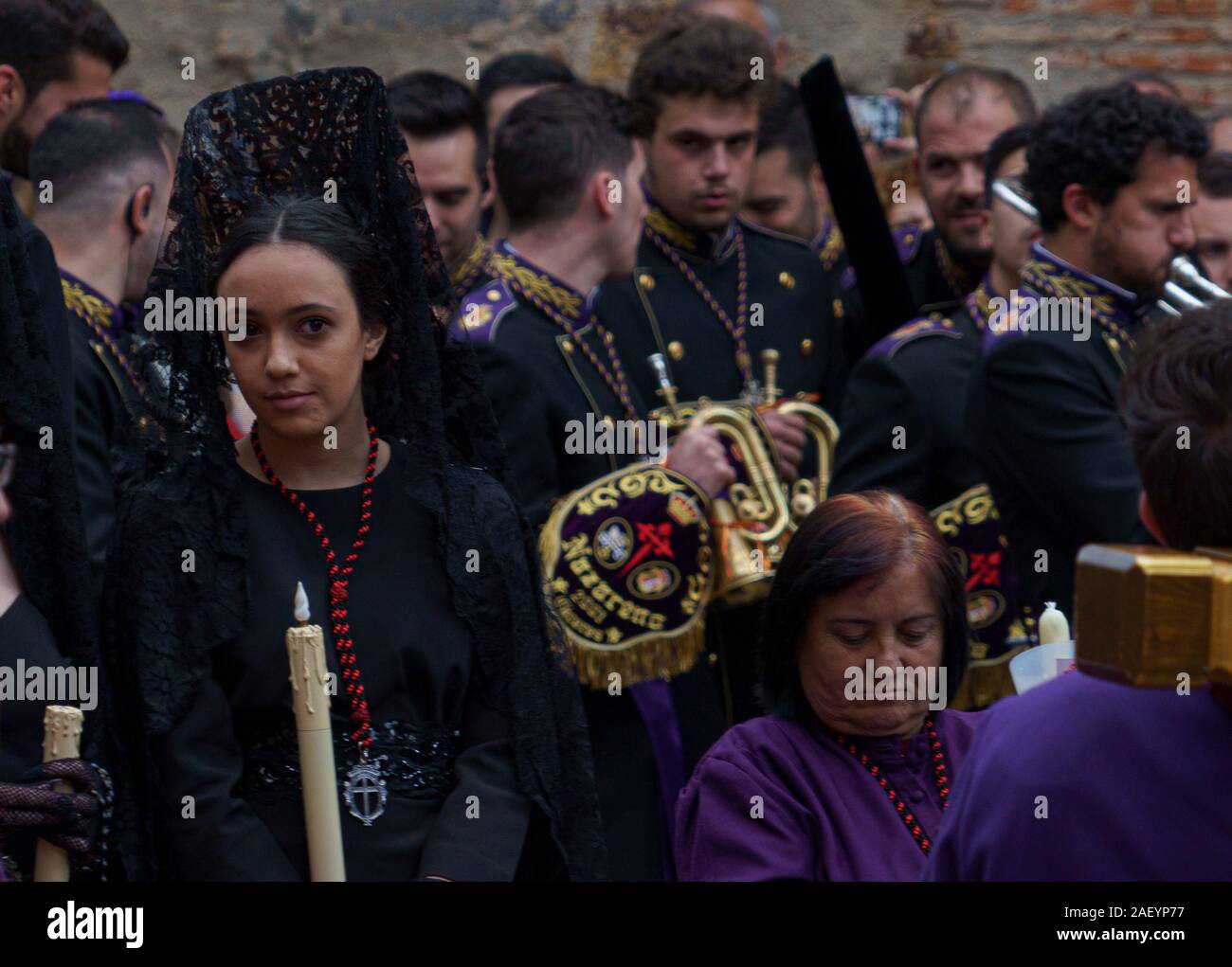 Girl in Easter procession with a black lace mantilla, a traditional ...