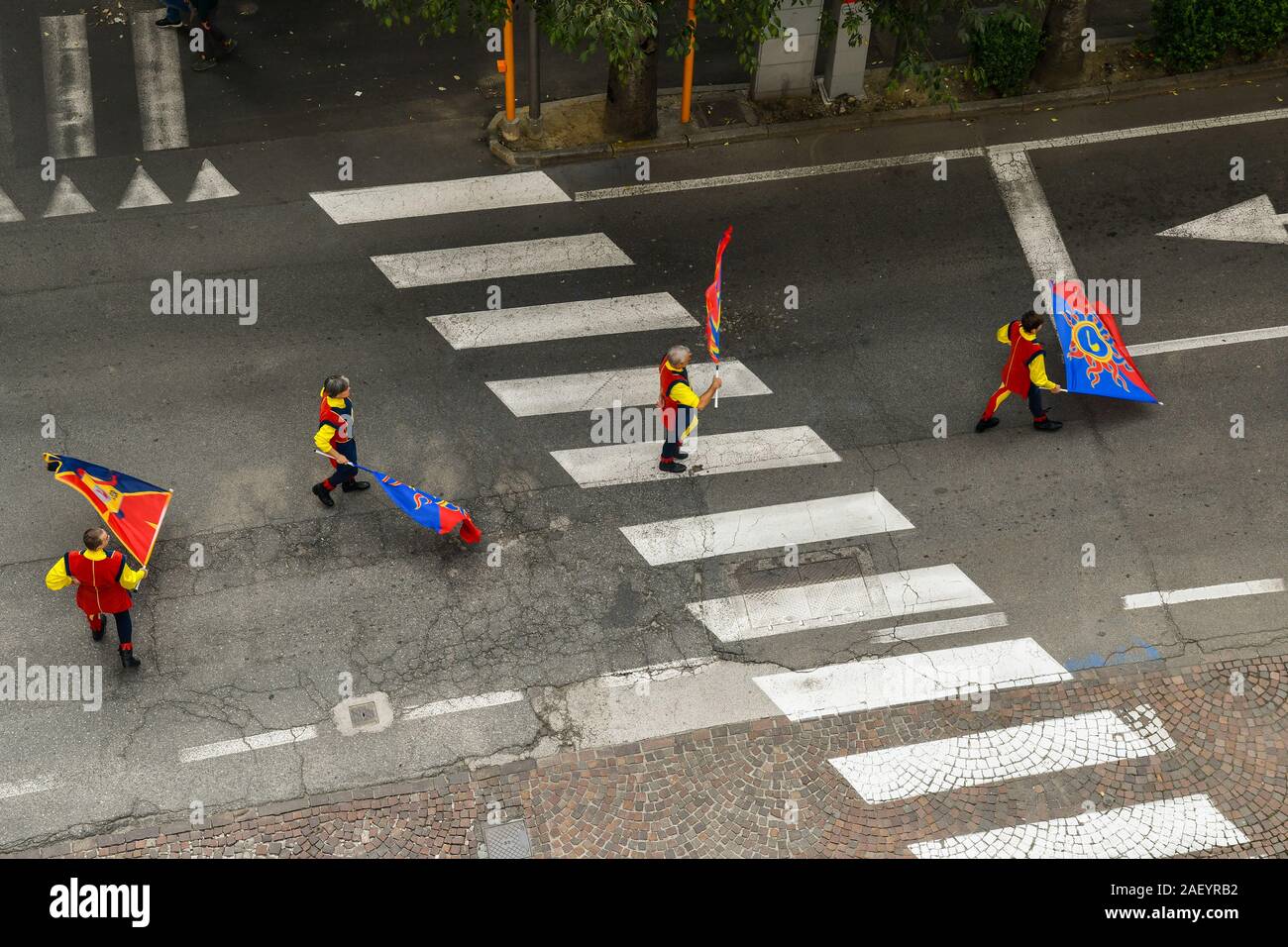 Elevated view of flag wavers in the historical parade of the famous ...