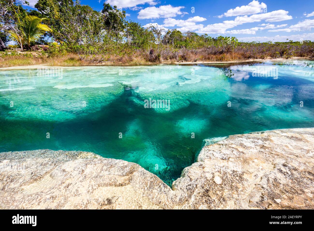 Azure pool and white rocks contrast near The Rapids, Bacalar, Quintana ...