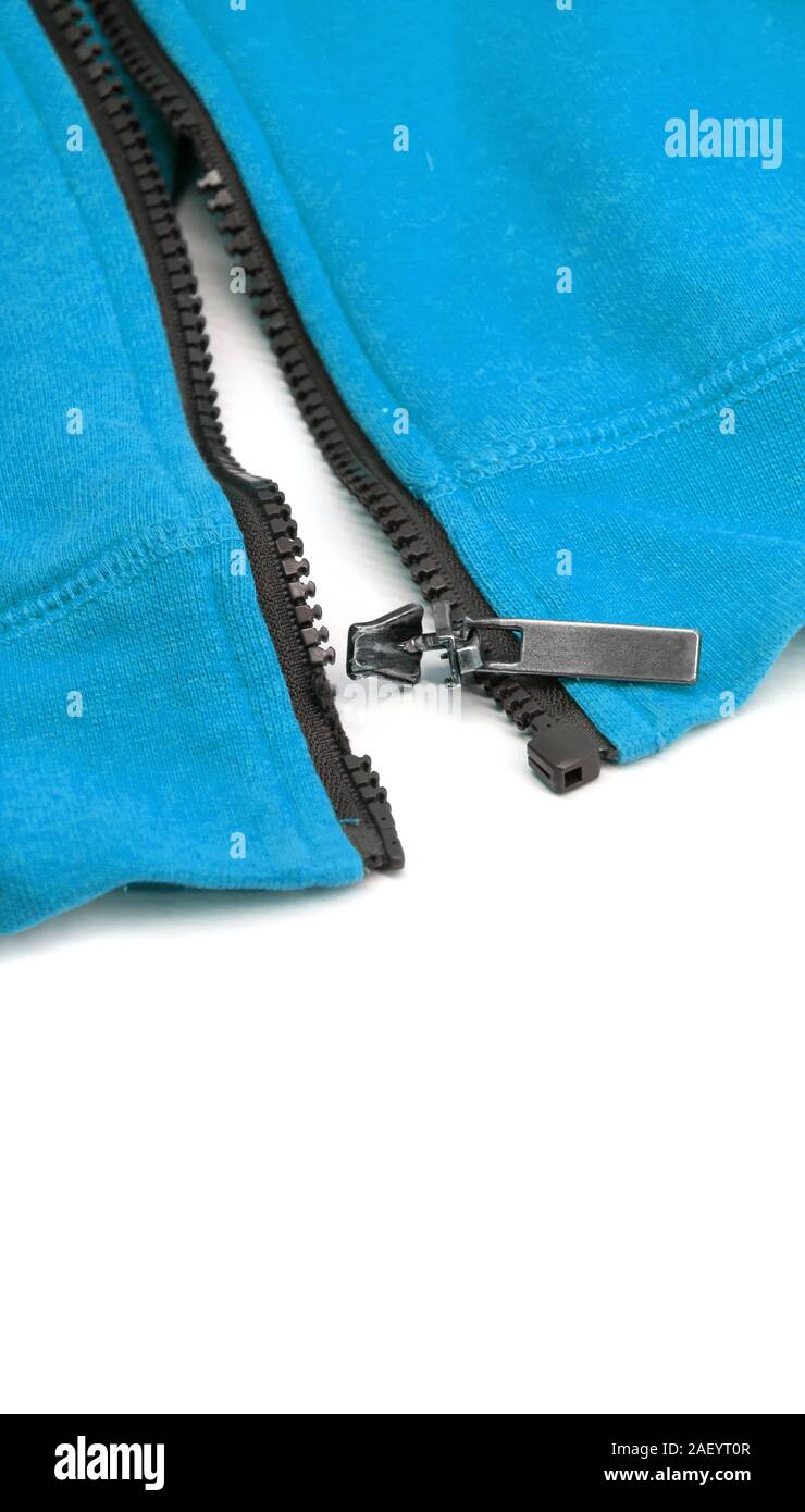 Broken zipper on blue shirt jacket. Detail close-up photo on white ...