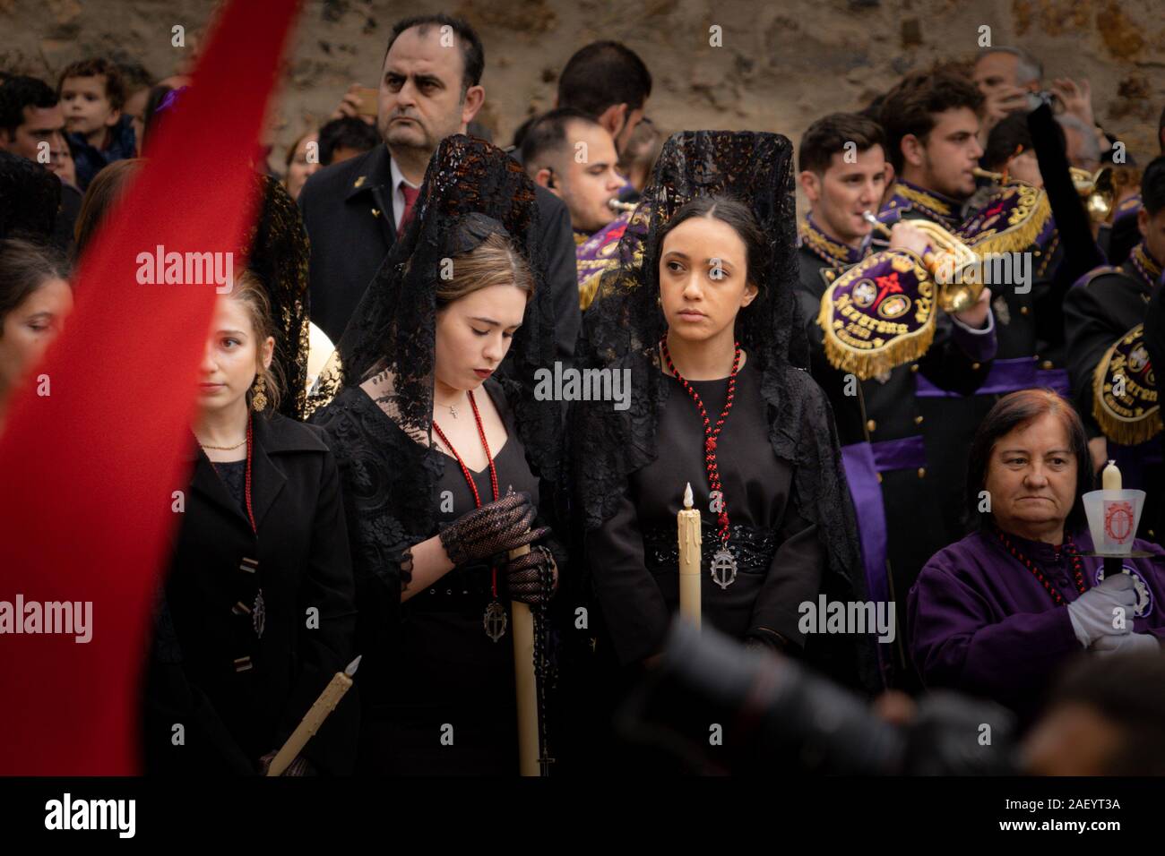Girls in Easter procession with a black lace mantilla, a traditional ...