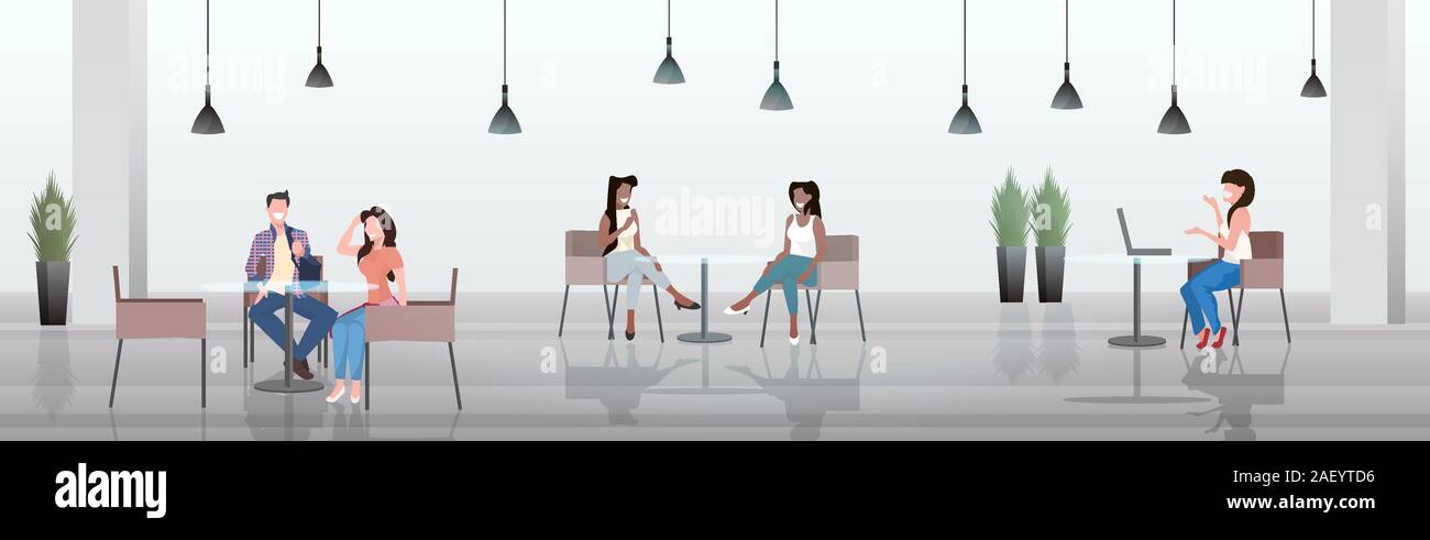 people sitting at cafe tables mix race visitors discussing during ...