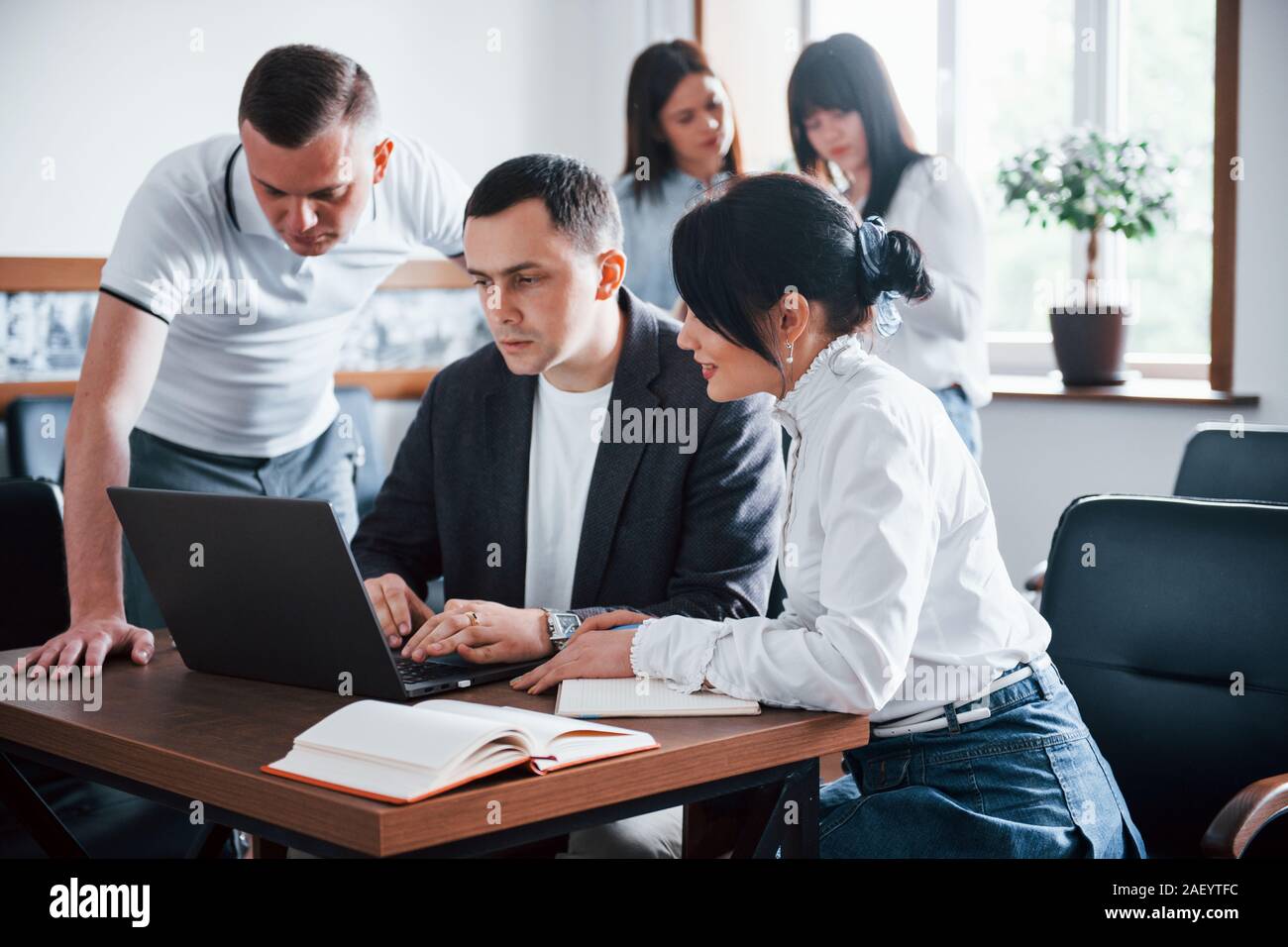 Business people and manager working on their new project in classroom ...