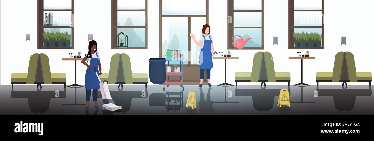 couple cleaners using rag and vacuum cleaner mix race female janitors ...