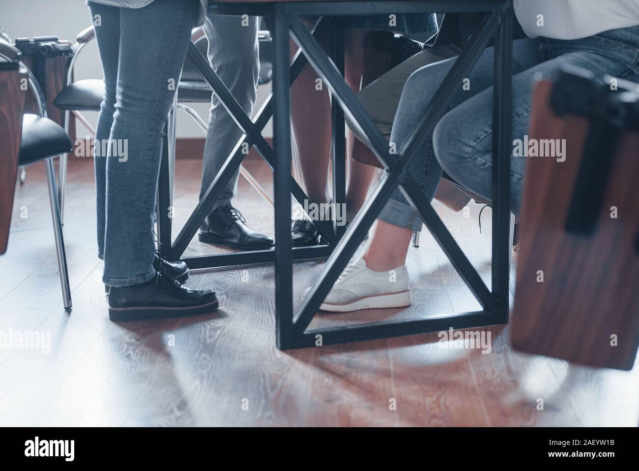 Grounded view. Group of people at business conference in modern ...