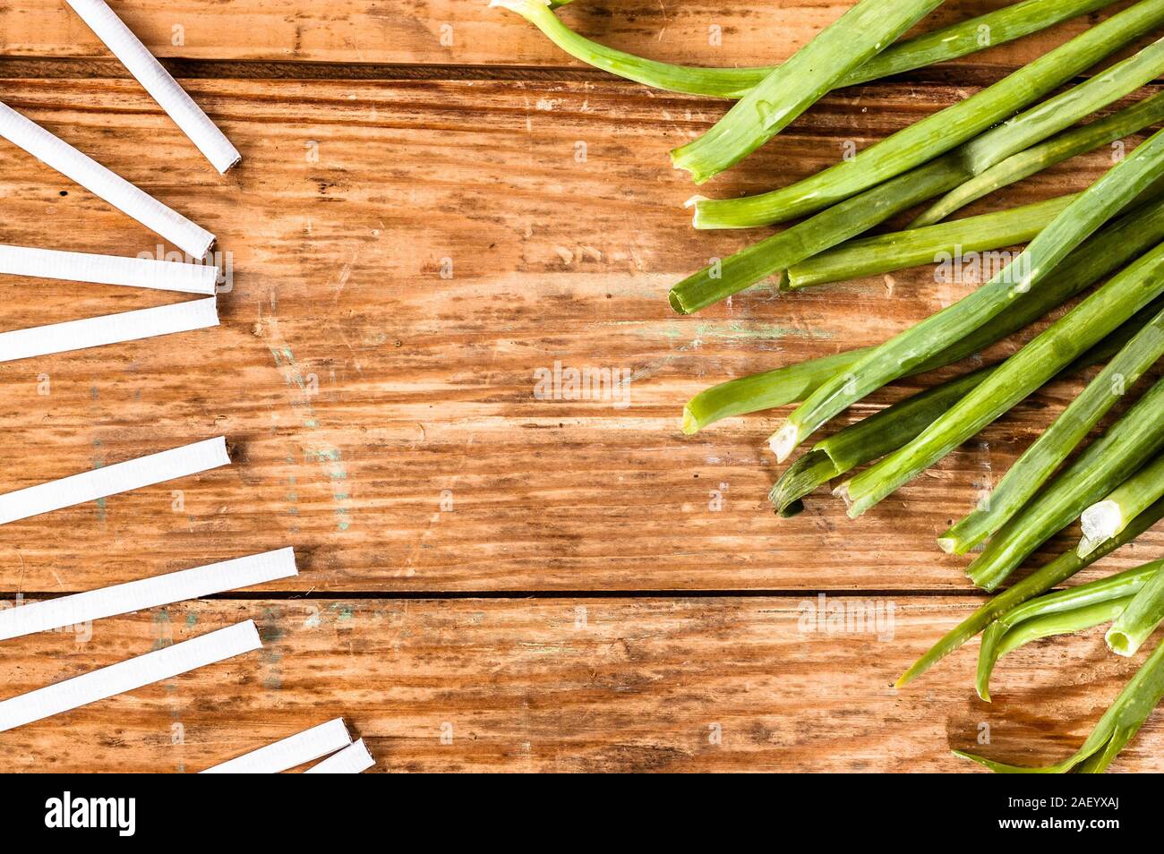 Concepts of quitting smoking. Cigarettes and chive arranged on grunge ...