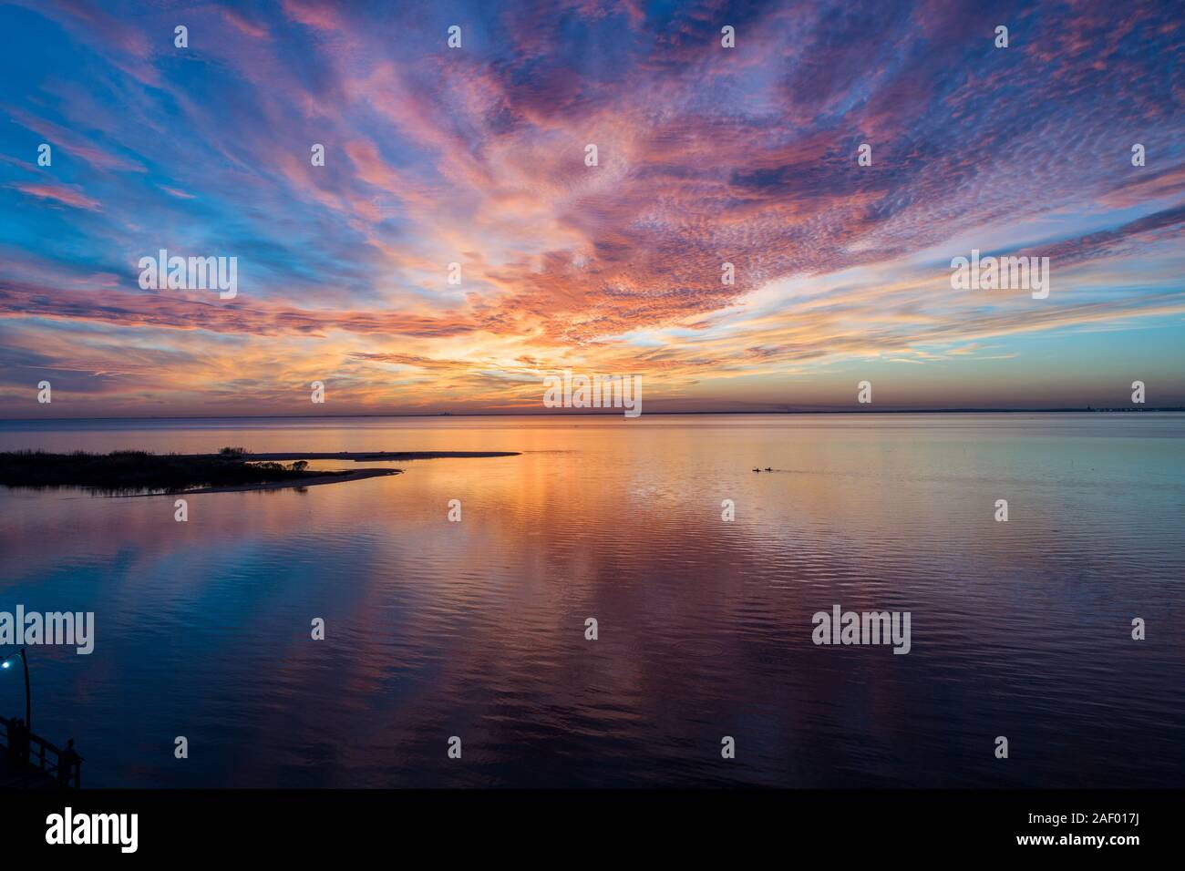 Beautiful sunset reflecting off of Mobile Bay on the Alabama Gulf Coast ...