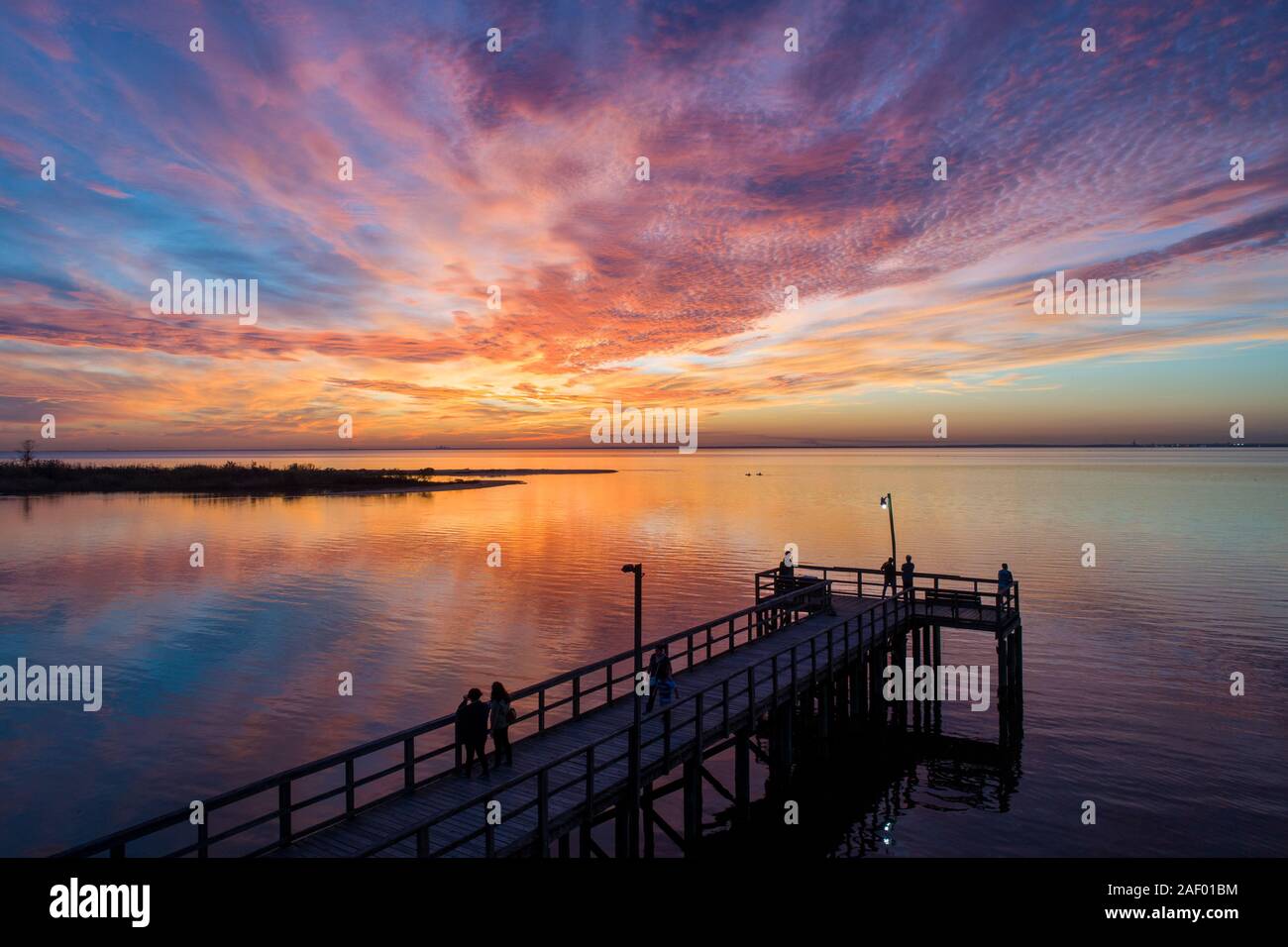 Beautiful sunset reflecting off of Mobile Bay on the Alabama Gulf Coast ...