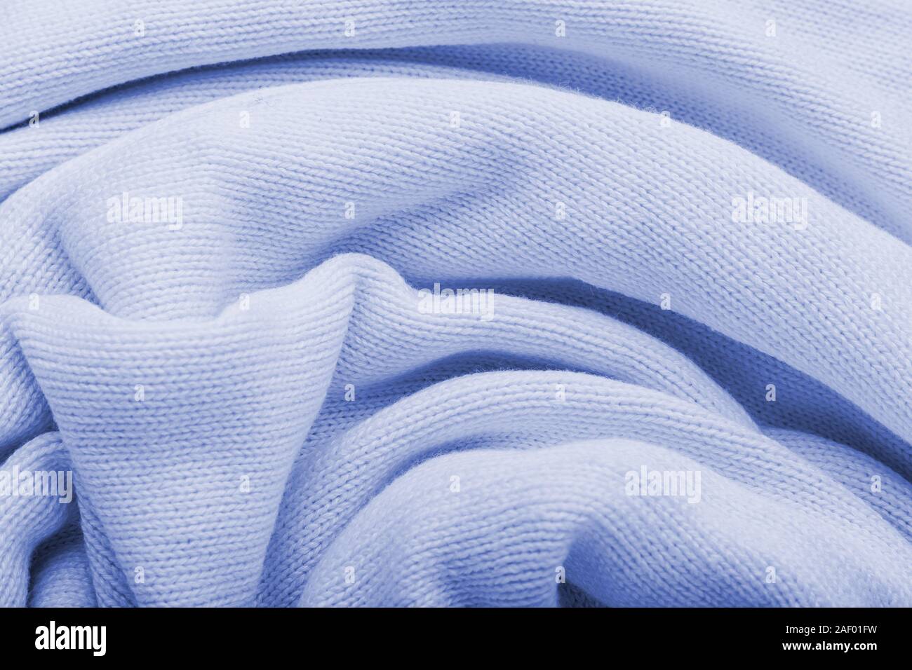 Classic blue knitted fabric wool texture for background. Close up of ...