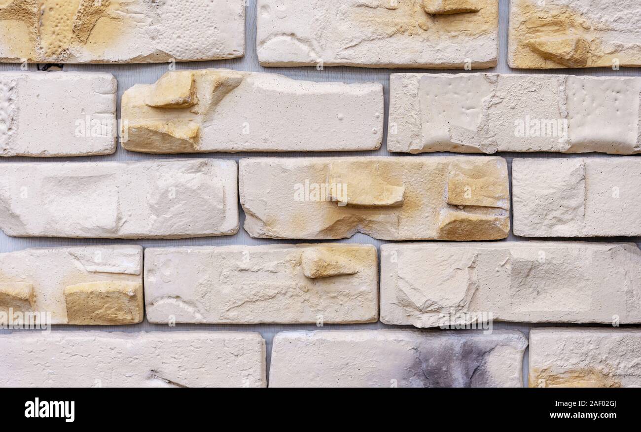 Brick wall of beige bricks. Background and texture of brickwork Stock ...