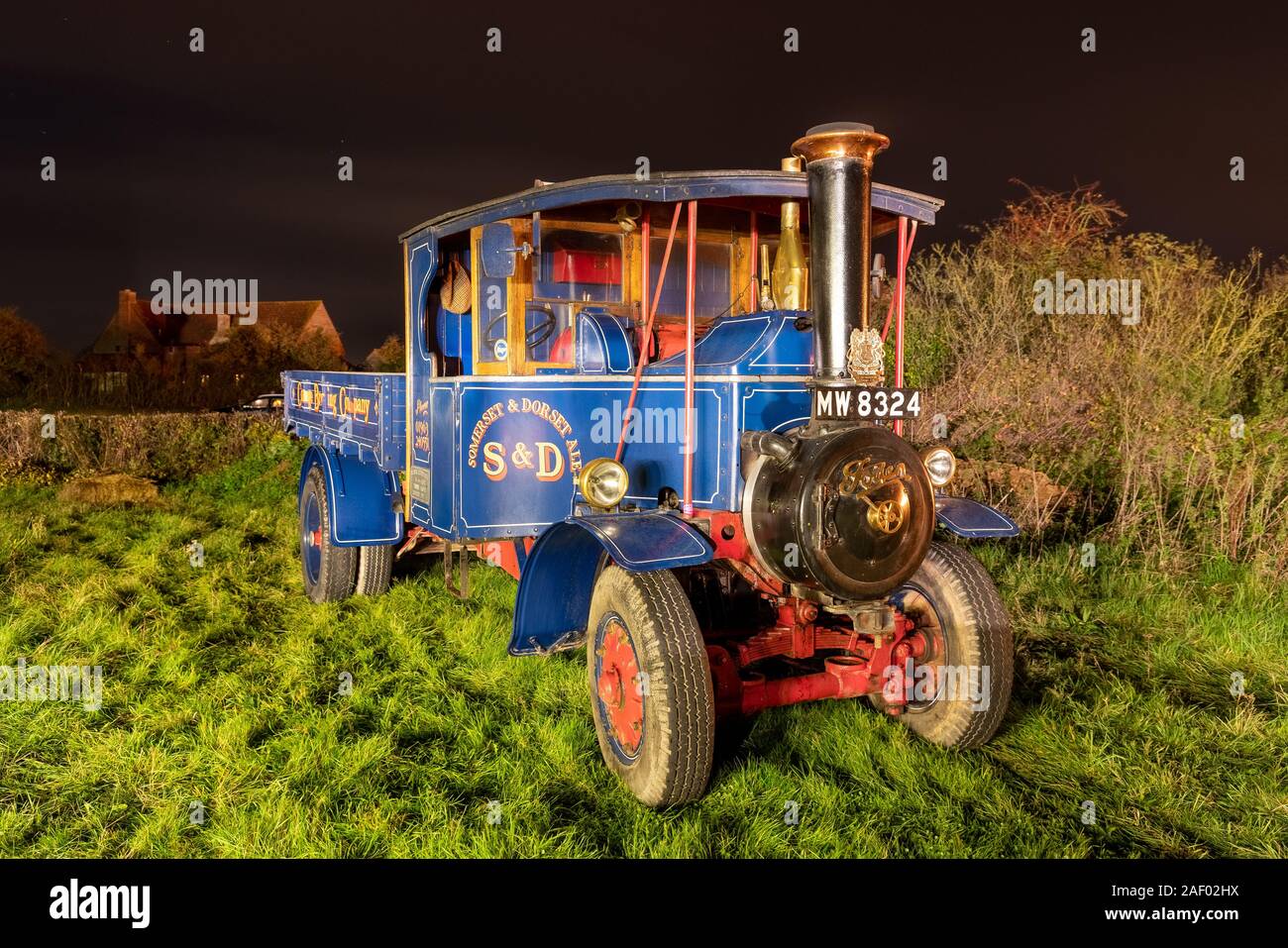 Night photo of a restored steam powered lorry Stock Photo - Alamy