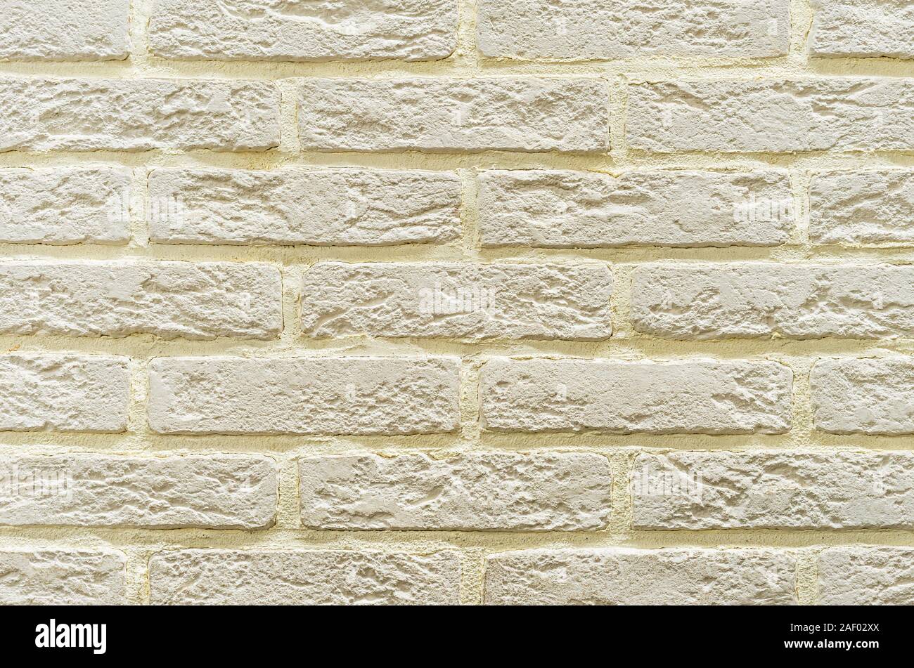 Brick wall of beige bricks. Background and texture of brickwork Stock ...