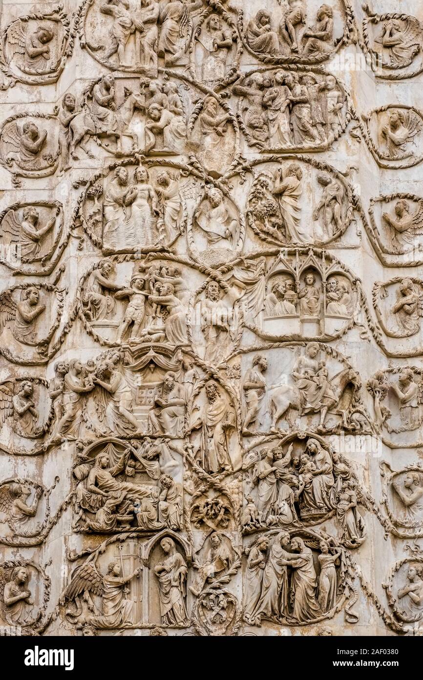 Detail of artful rock carvings of the gothic facade of Orvieto ...