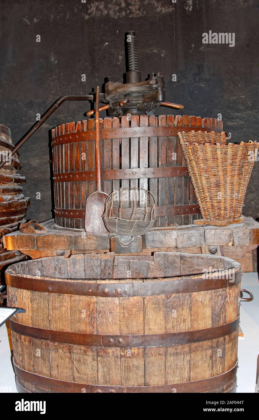 wine press, wood barrel, woven basket, strainer, shovel, old equipment ...