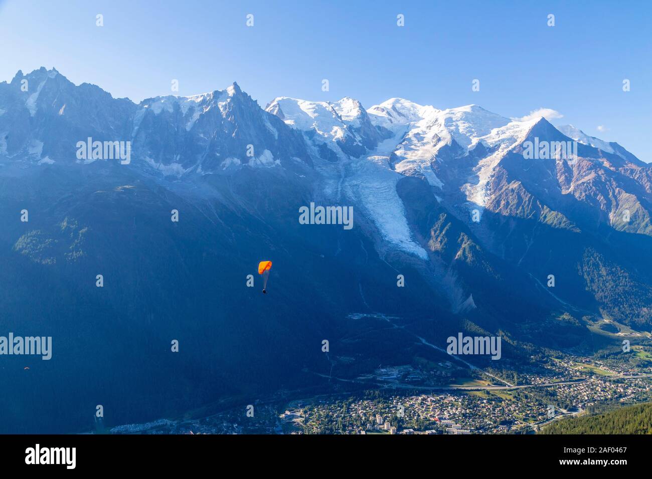Tandem paraglider flight at take off point above chamonix mont b hi-res ...