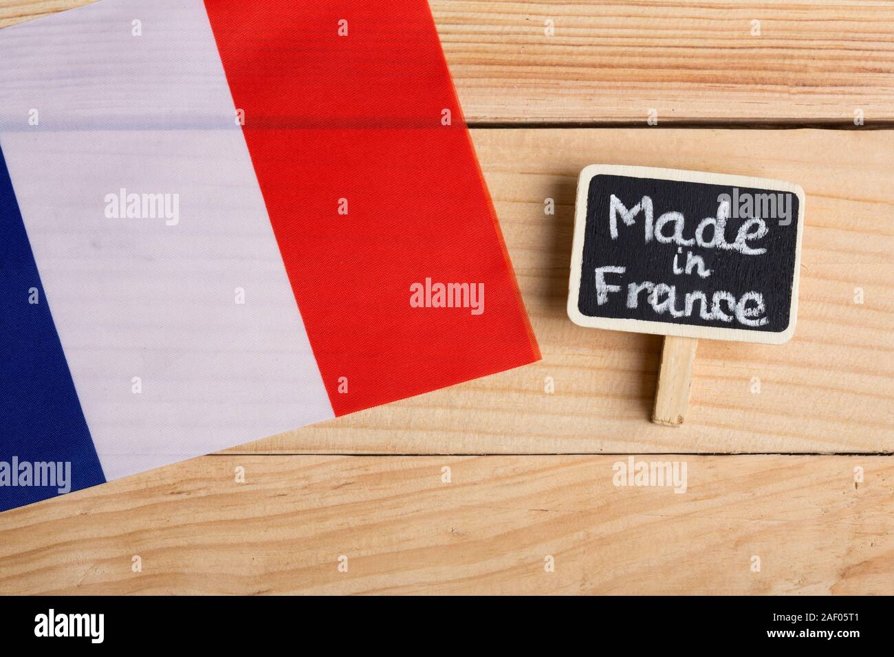 quality concept - French flag and blackboard with Text Made in France ...