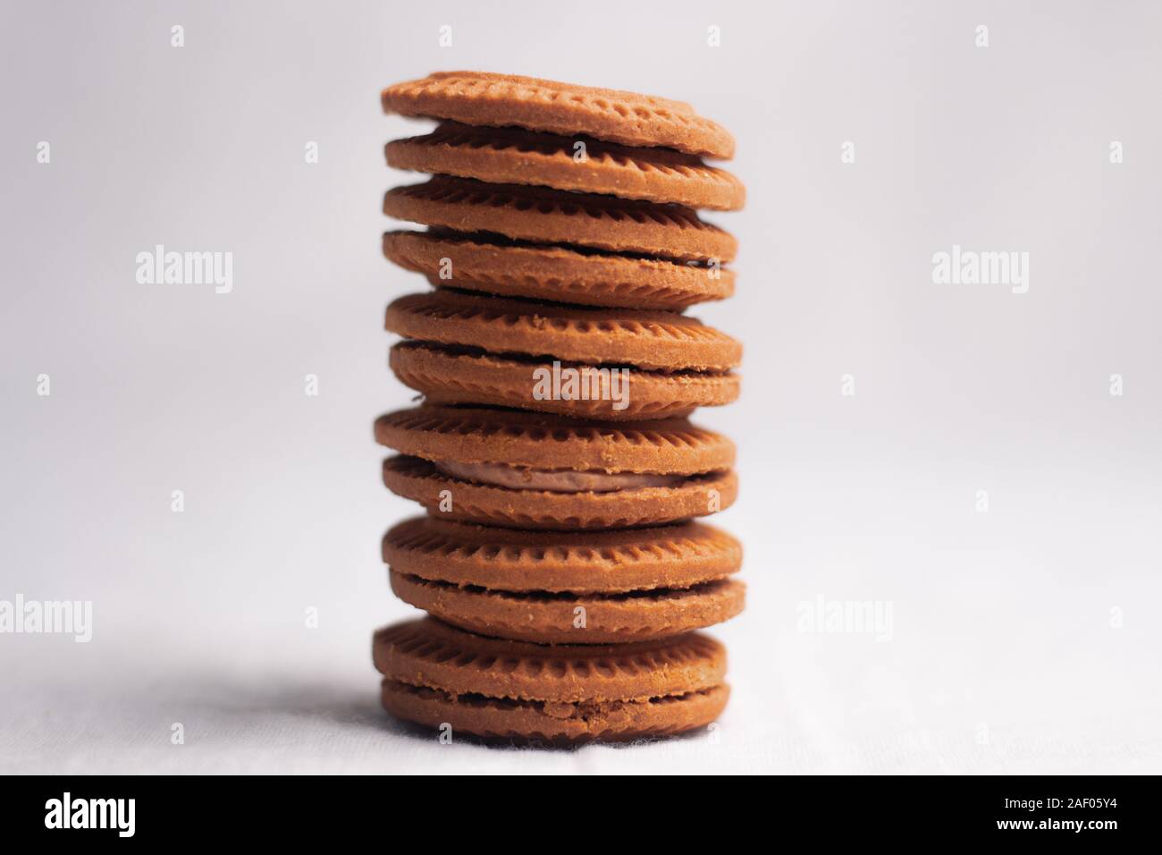 pile of brown cream biscuits Stock Photo - Alamy