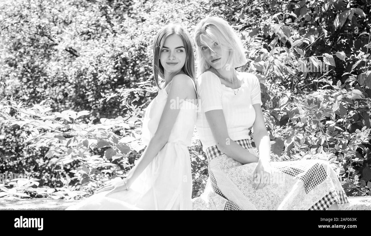 Two girls chatting Black and White Stock Photos & Images - Alamy