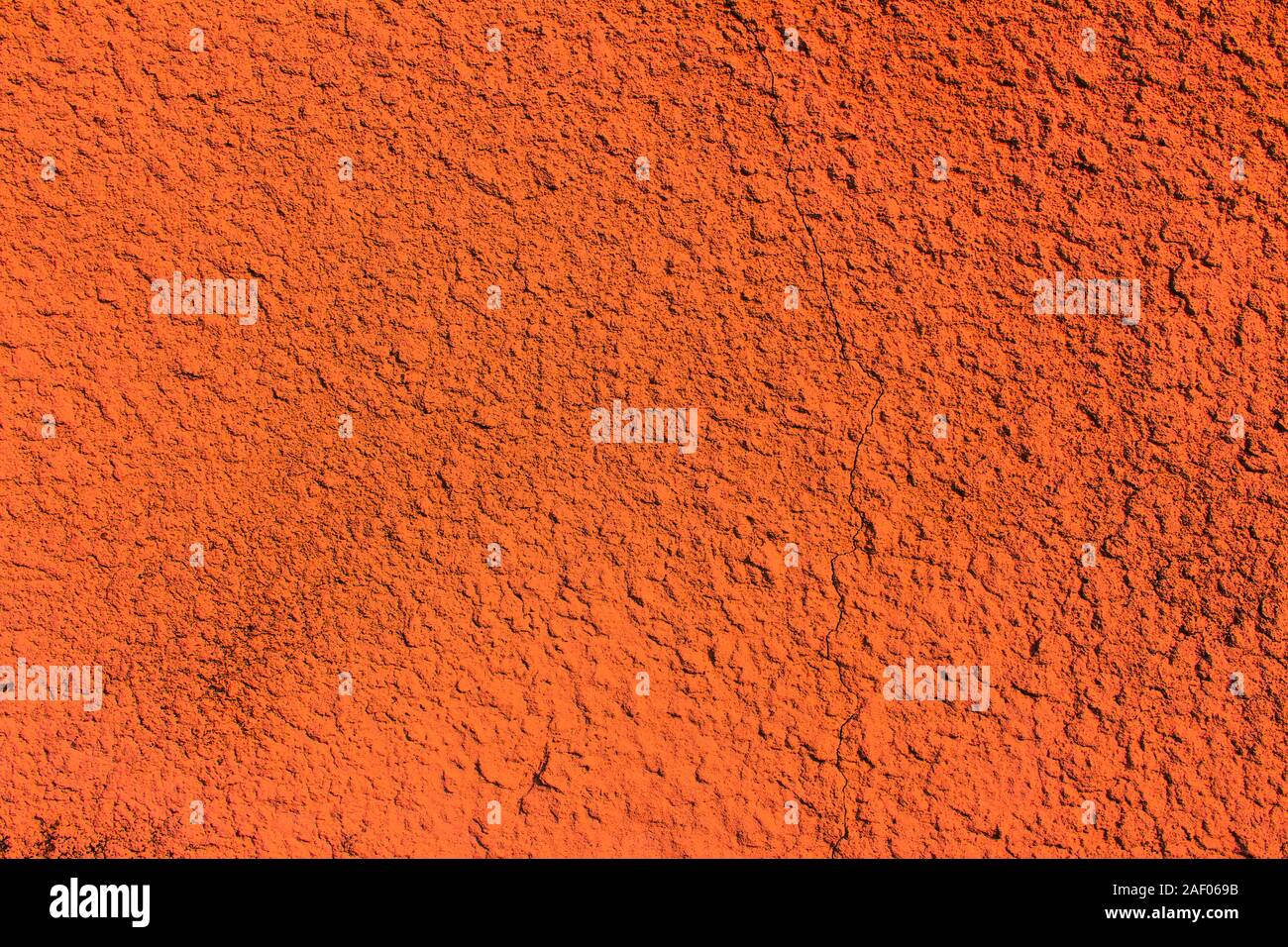 Orange colored background with textures of different shades of orange ...