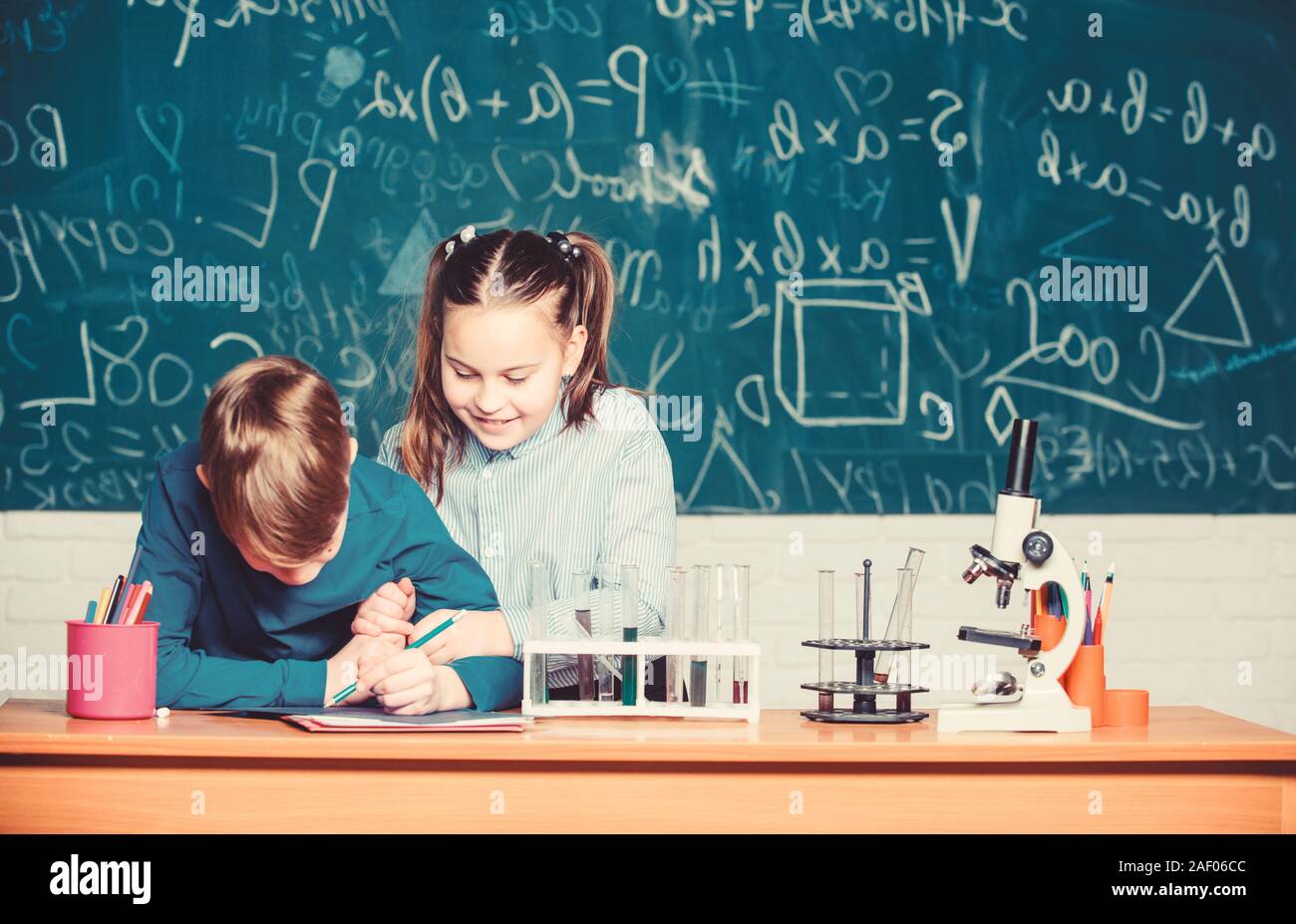 Chemistry science. biology experiments with microscope. Little kids ...