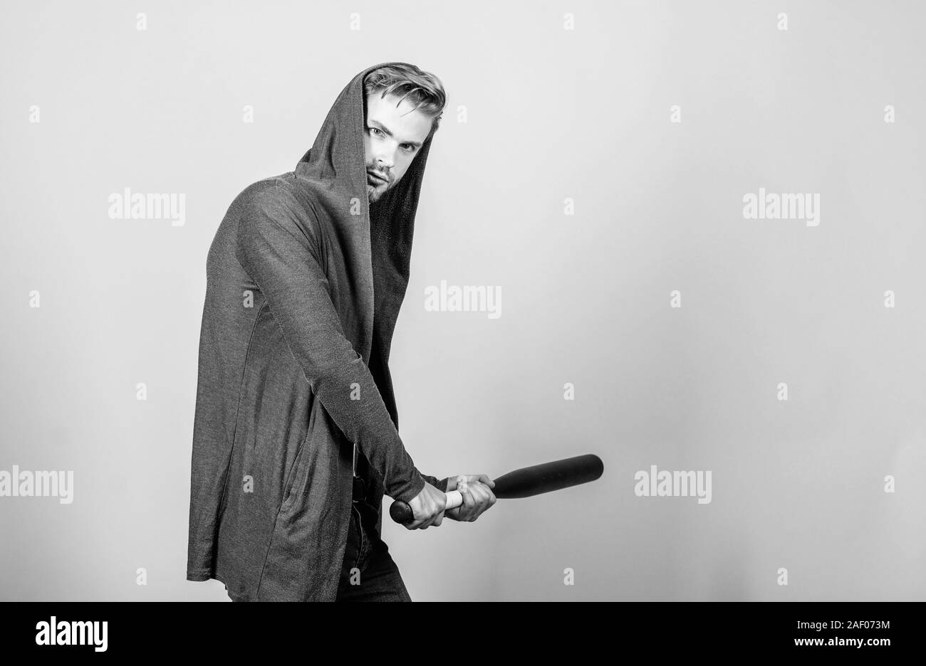 Self defence. Sport equipment. Man bully guy with baseball bat ...
