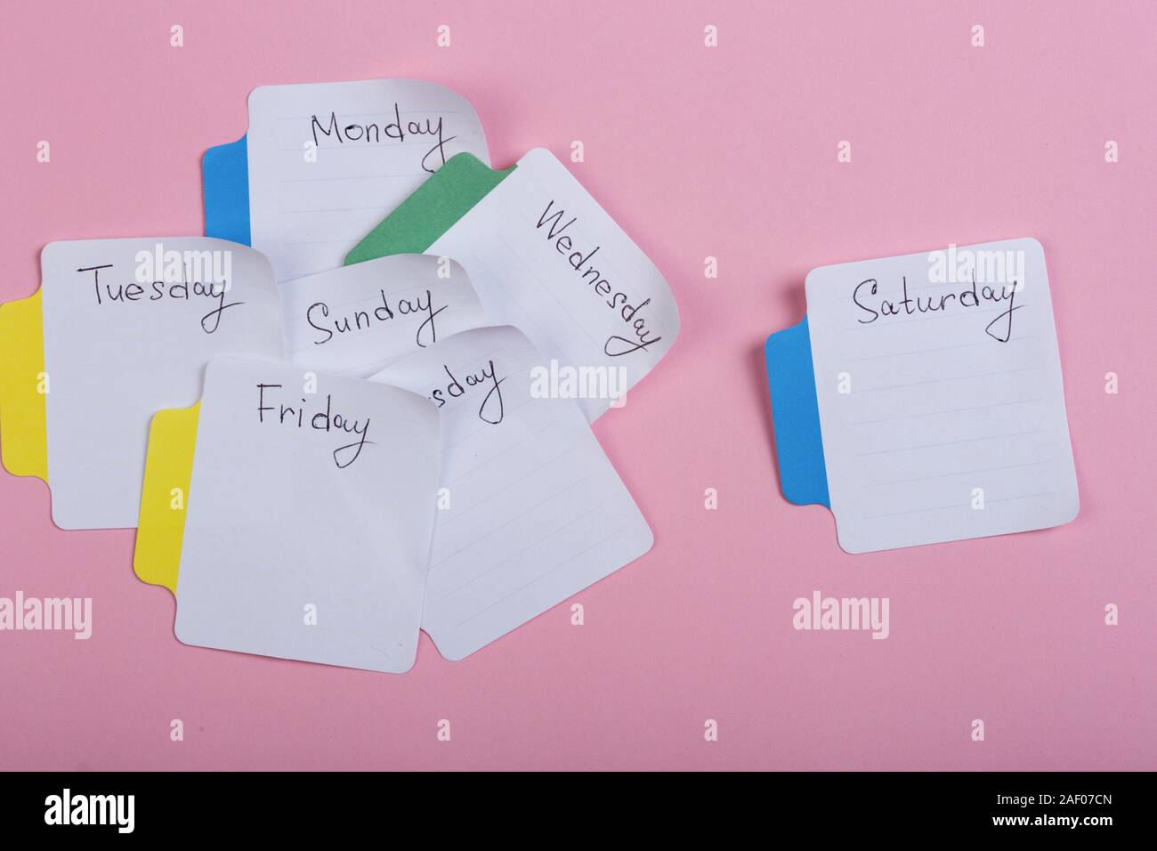 The days of the week - the paper stickers attached to the pink ...