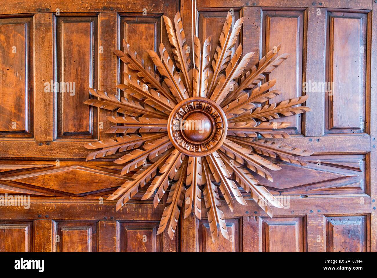 Sun carved in wood hi-res stock photography and images - Alamy