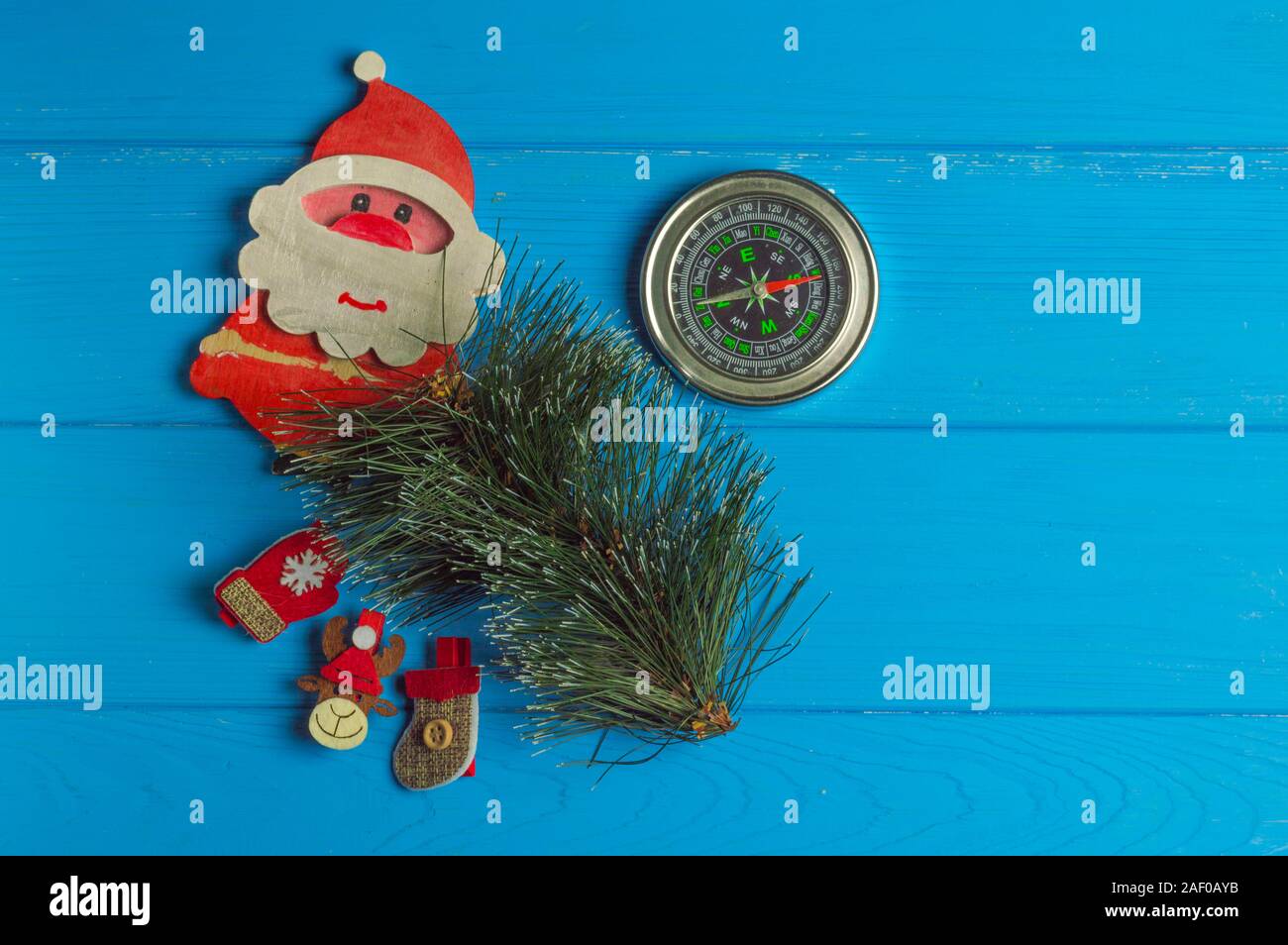 Compass points where Santa lives: compass and Christmas figurines are ...