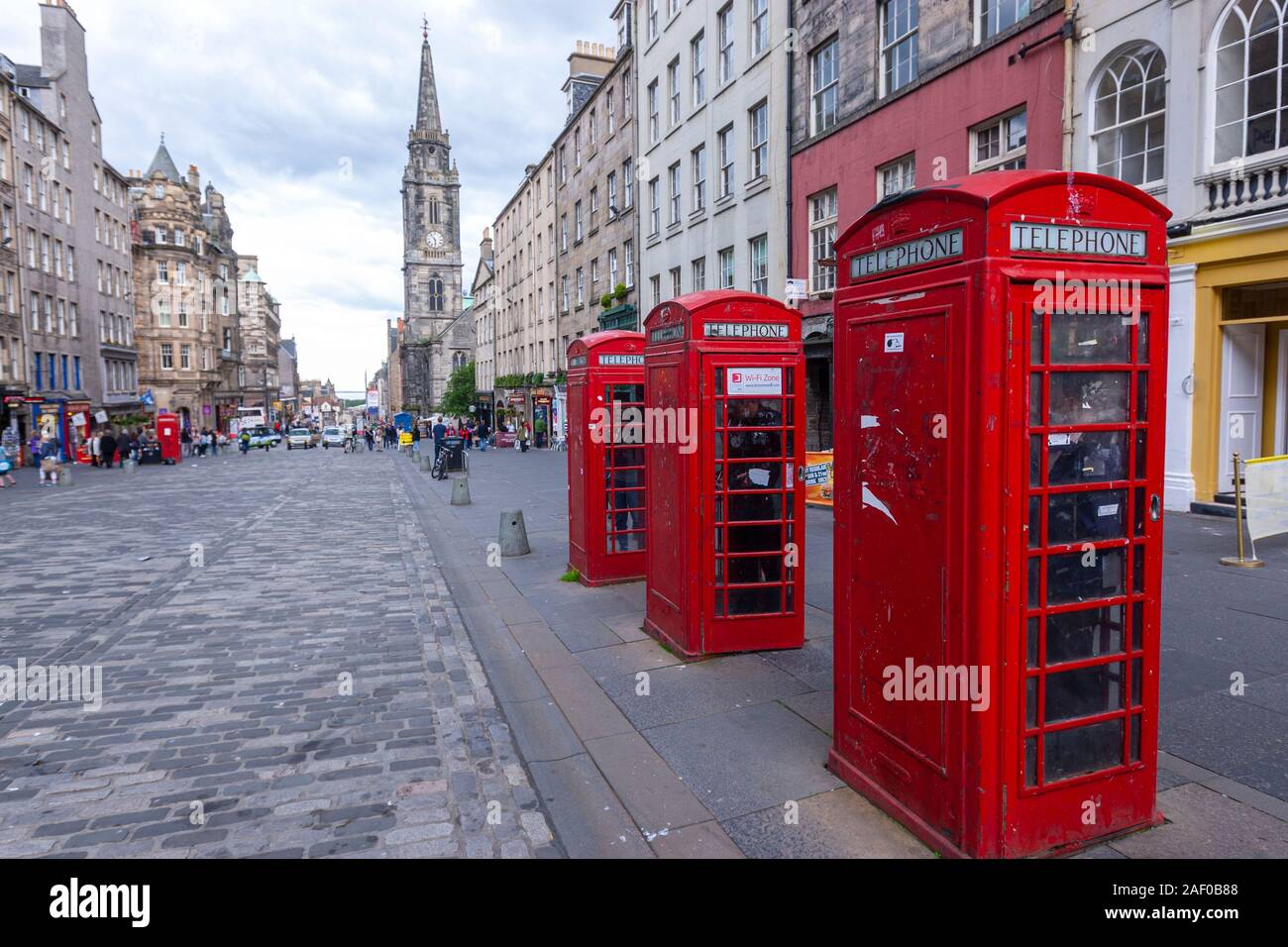 Telephone red box row of three in High St, Edinburgh, Scotland, UK ...