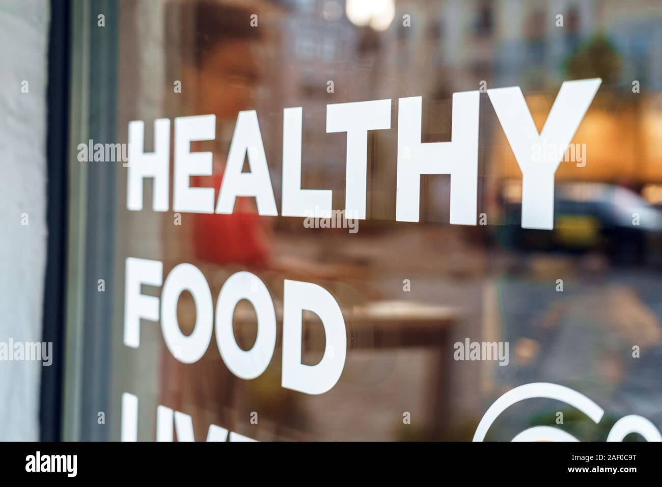 Healthy food cafe sign on glass close-up Stock Photo - Alamy