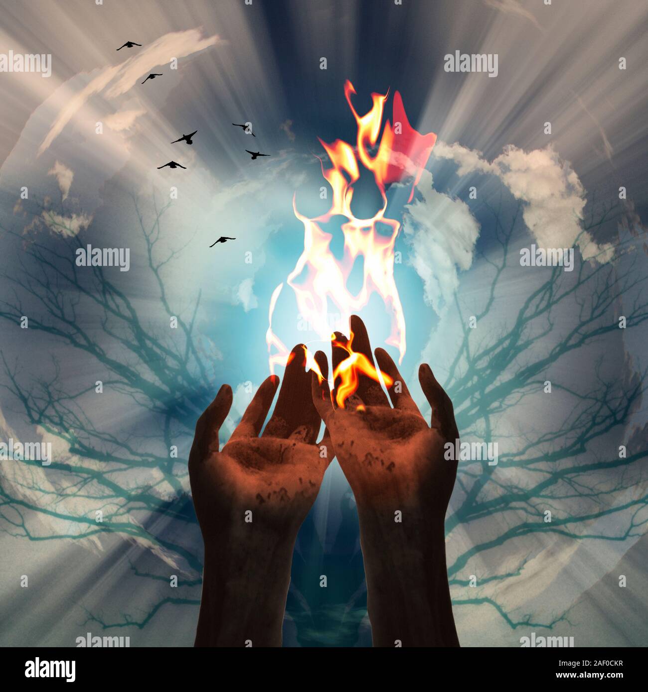 Spiritual composition. Creation of Fire Stock Photo - Alamy