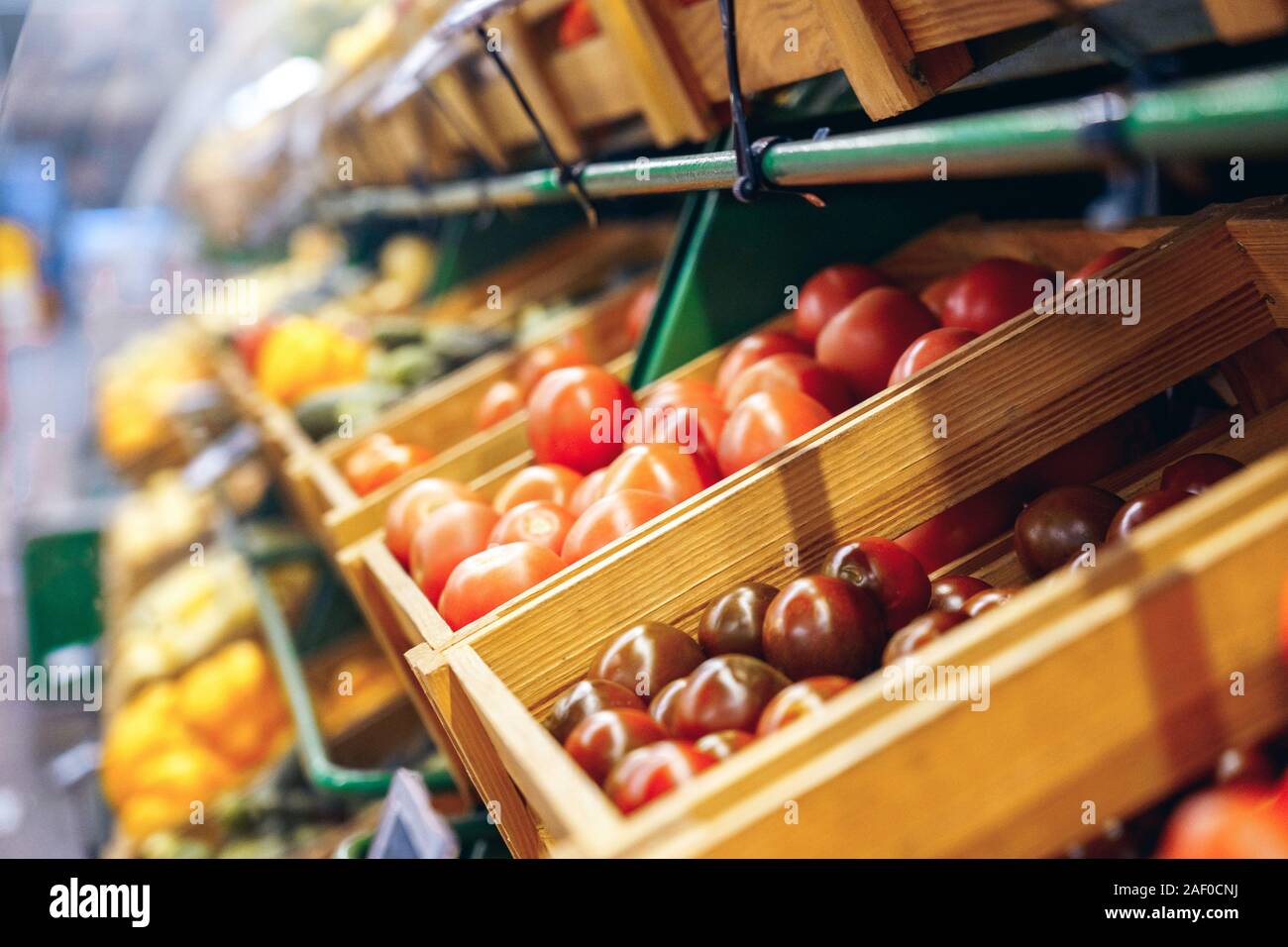 Fresh red tomatoes in box at supermarket Stock Photo - Alamy