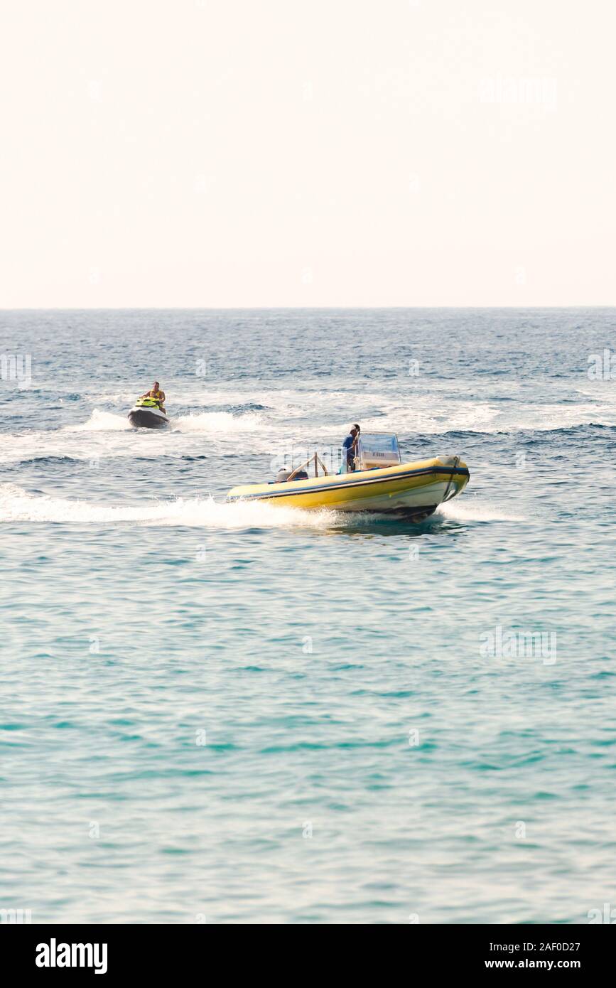 Pathos. Cyprus. The November 2019. Motor boat and jet ski. People have ...
