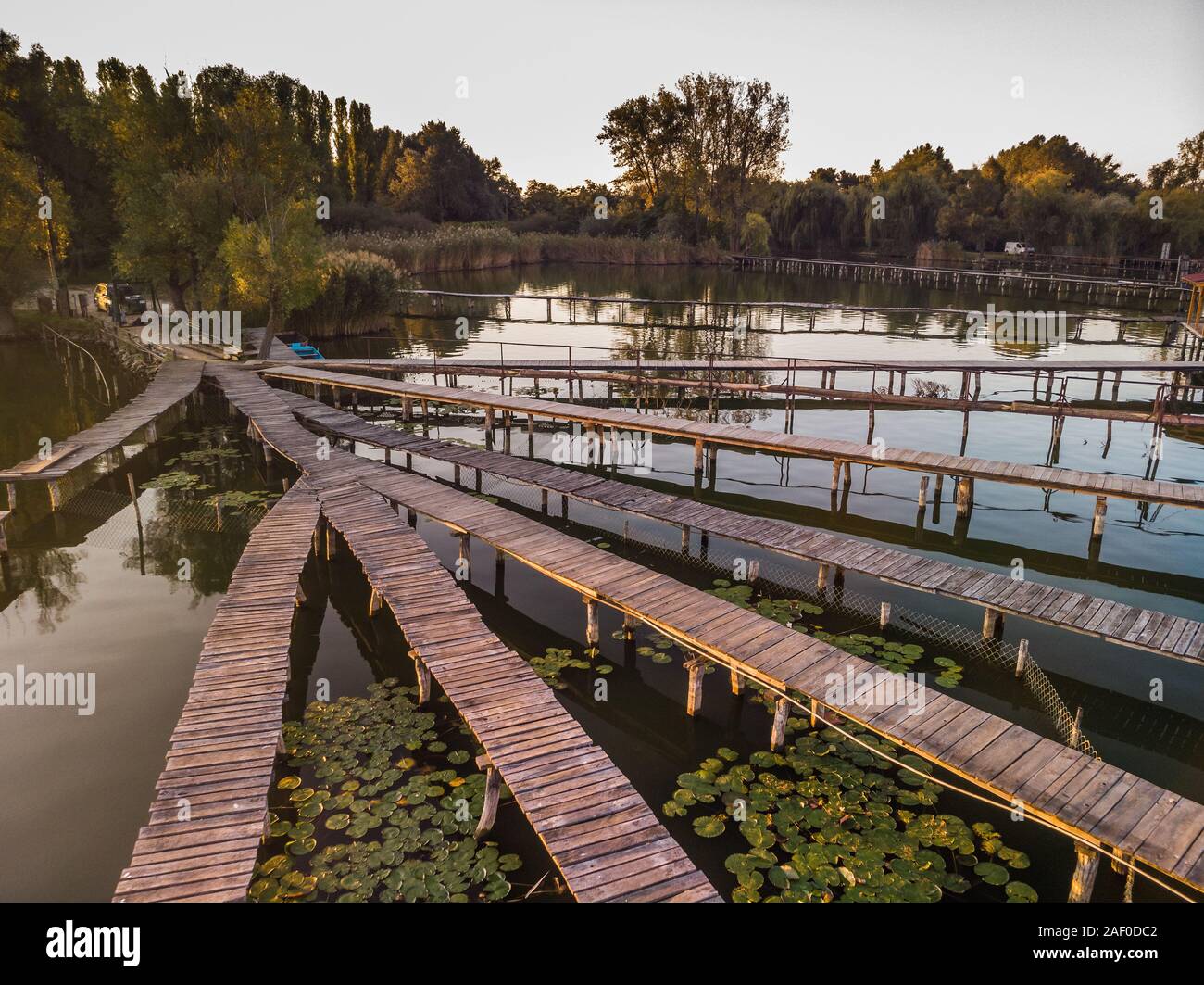 Floating village Bokodi to in Hungary at sunsrise. These houses belong ...