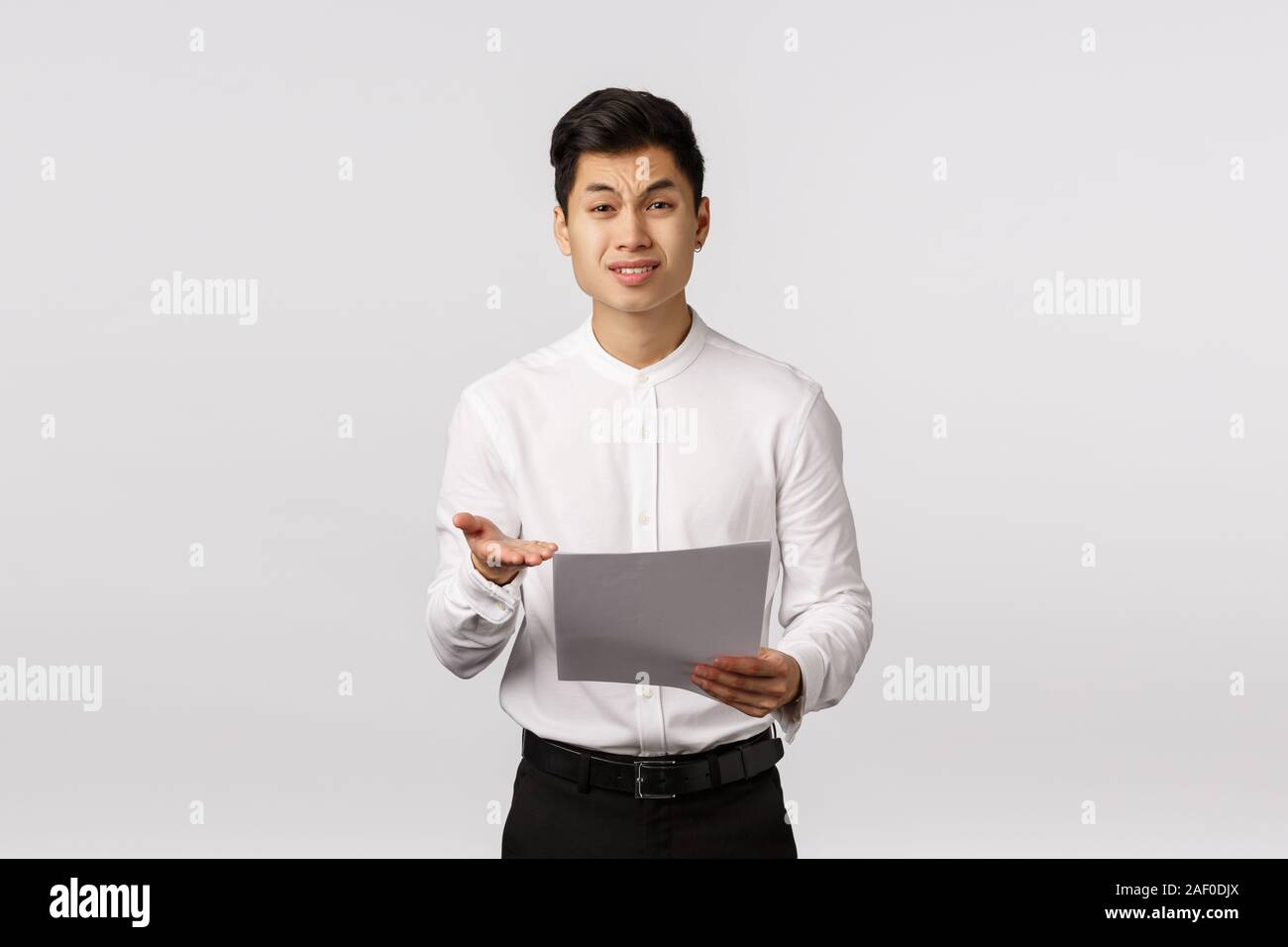 Unimpressed man suit hi-res stock photography and images - Alamy