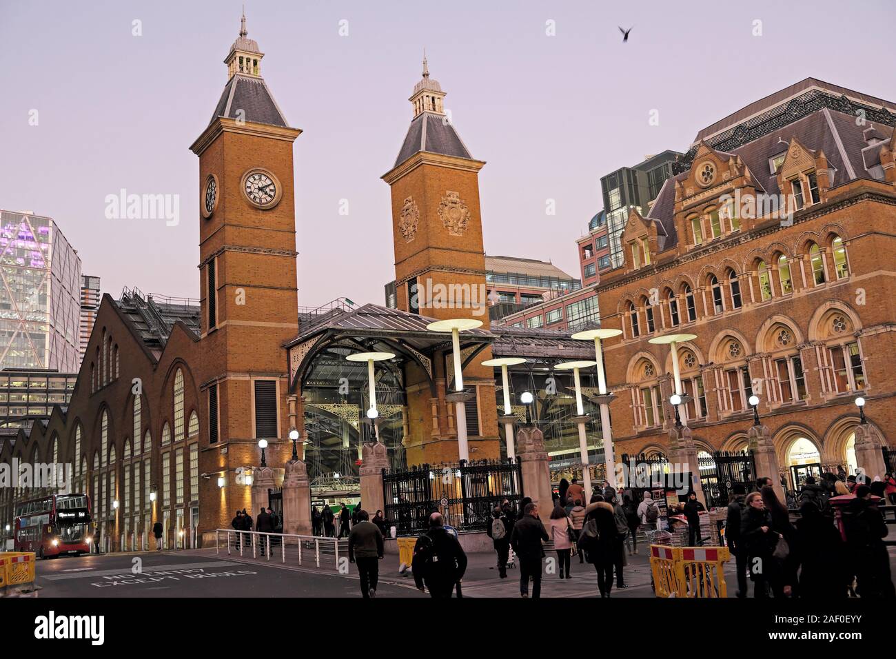 People leaving work walking in the street outside Liverpool Street ...