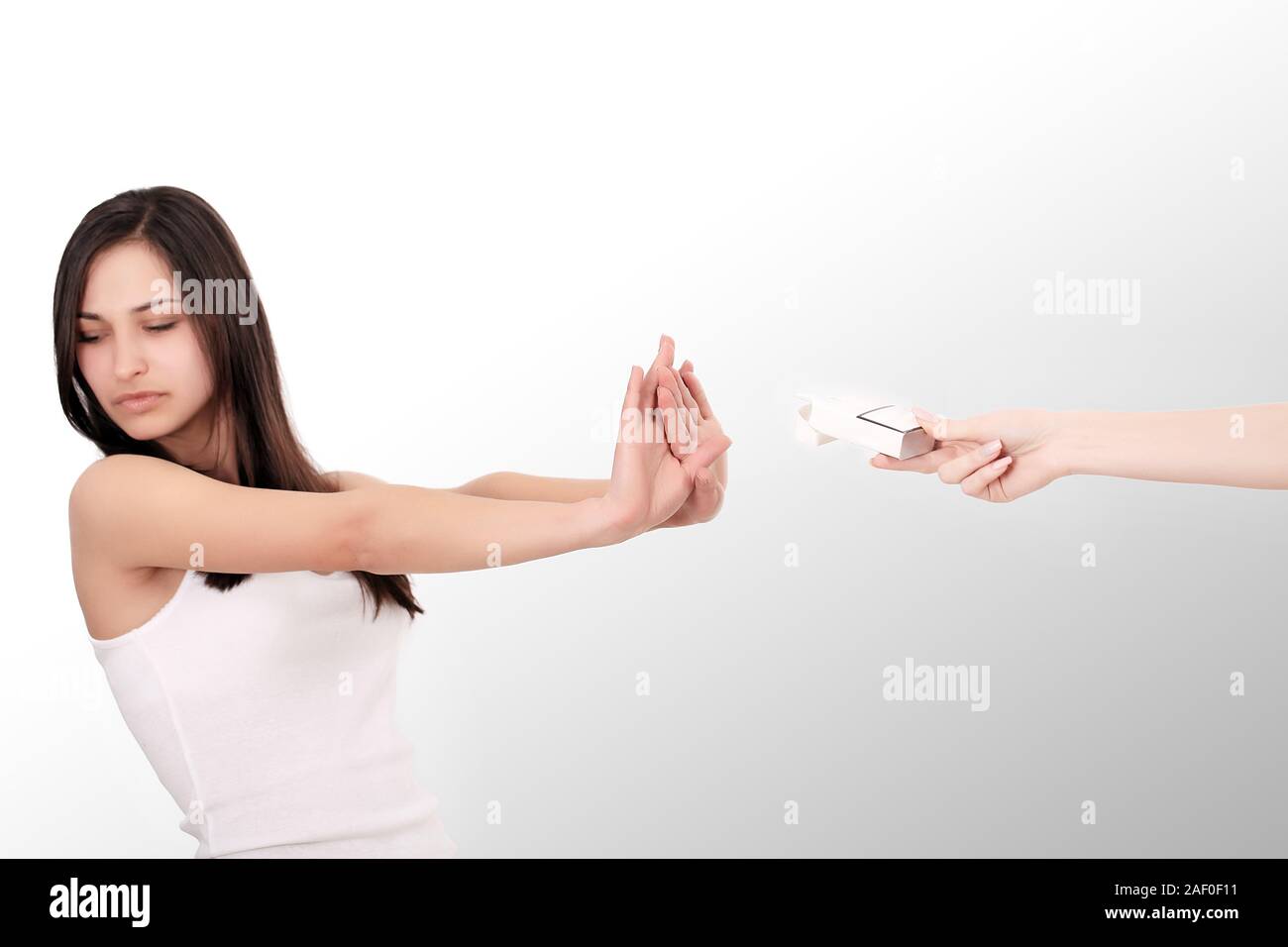 Healthy Young Woman Refusing To Take Cigarette From Pack. Portrait Of ...