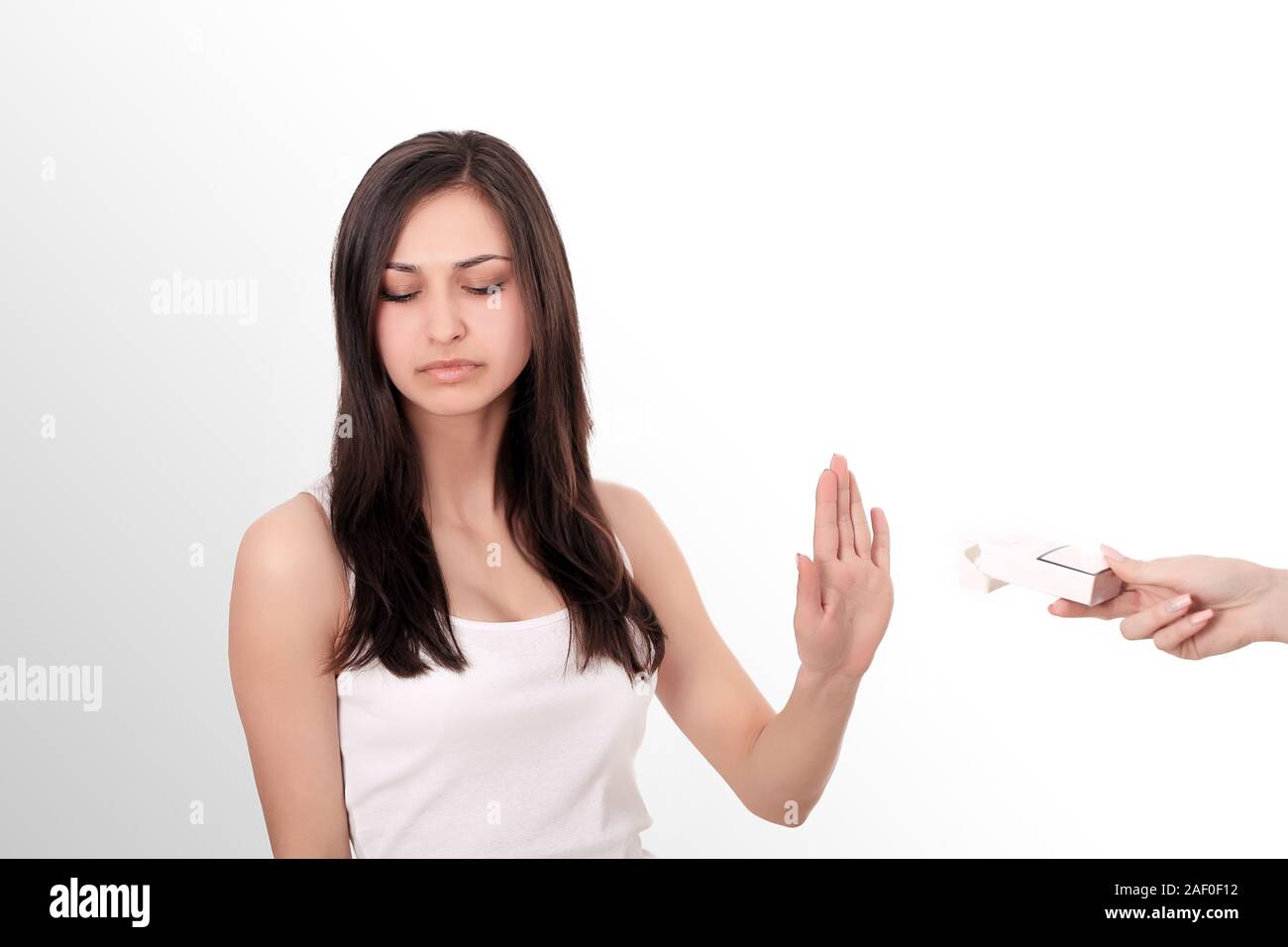 Healthy Young Woman Refusing To Take Cigarette From Pack. Portrait Of ...