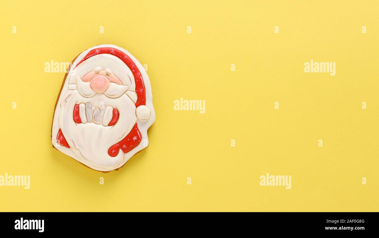 Gingerbread Santa Claus on a festive yellow background, Happy New Year ...