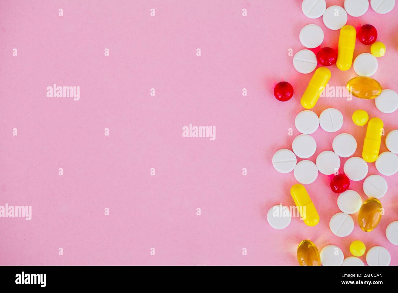 Medical Concept. Colored Pills And Capsule On Pink Background. Pharmacy ...