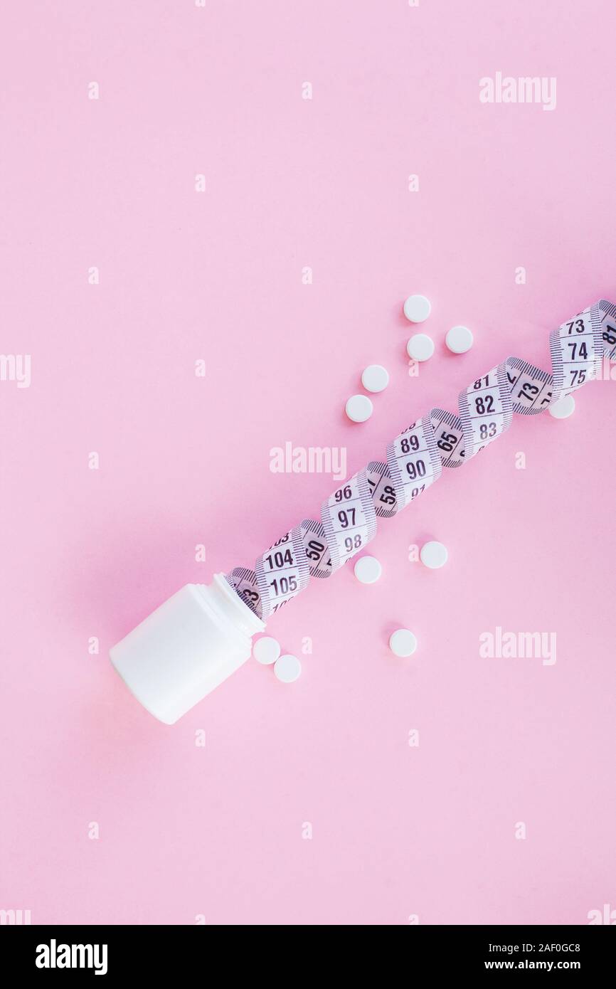 Medical Concept. Colored Pills And Capsule On Pink Background. Pharmacy ...